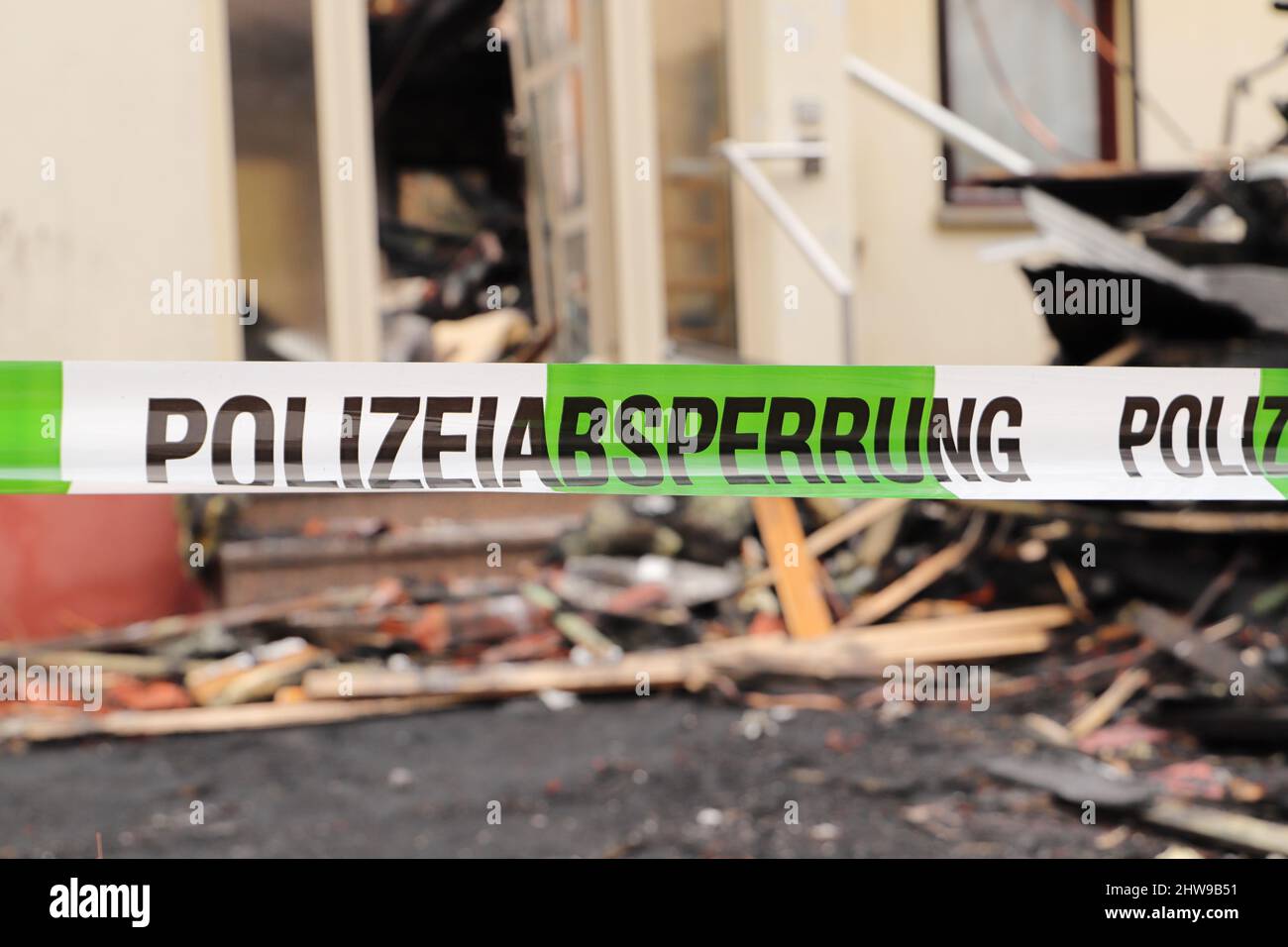 a police cordon at a burned down house Stock Photo - Alamy