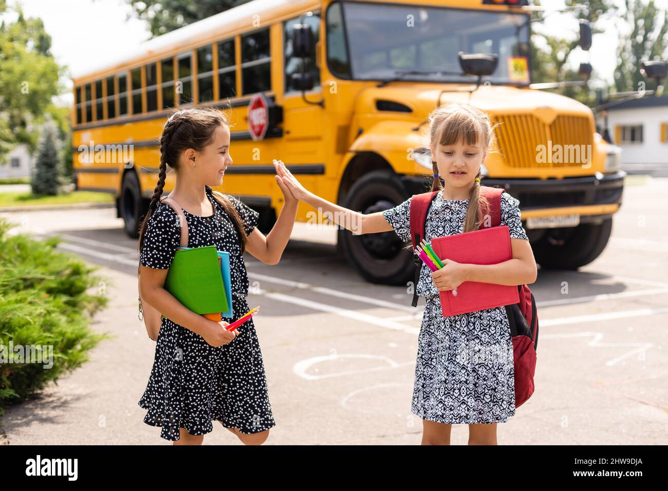 Children running school bus hi-res stock photography and images - Alamy