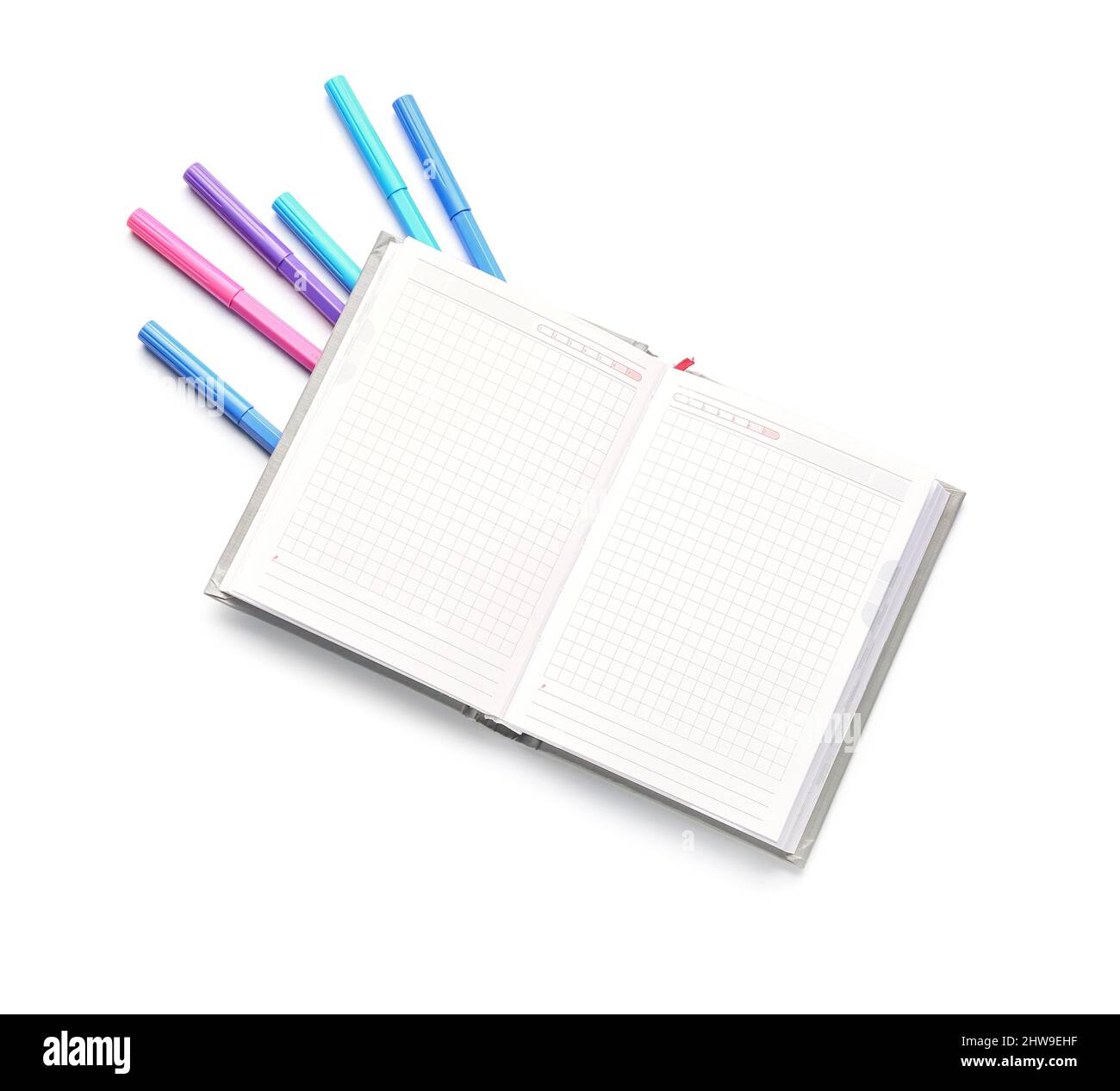 Blank open notebook and felt-tip pens on white background Stock Photo ...