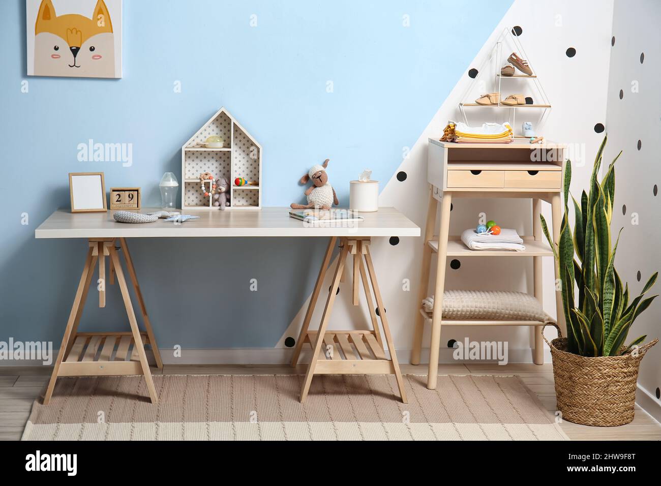 Interior of children's bedroom with tables Stock Photo - Alamy