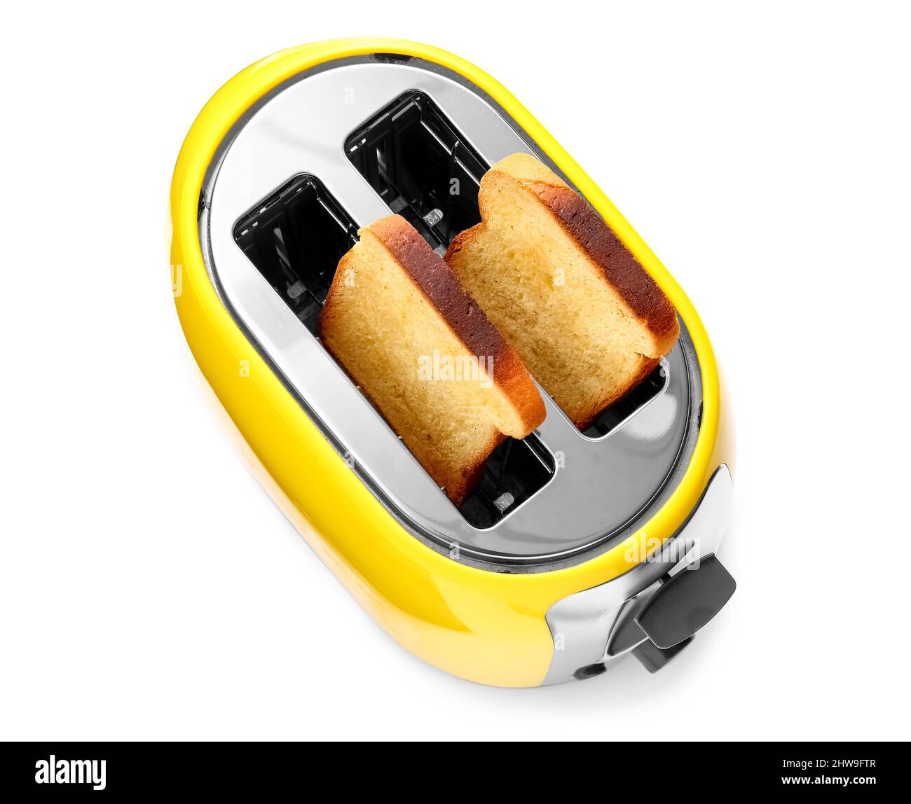 Modern toaster with bread slices on white background Stock Photo - Alamy