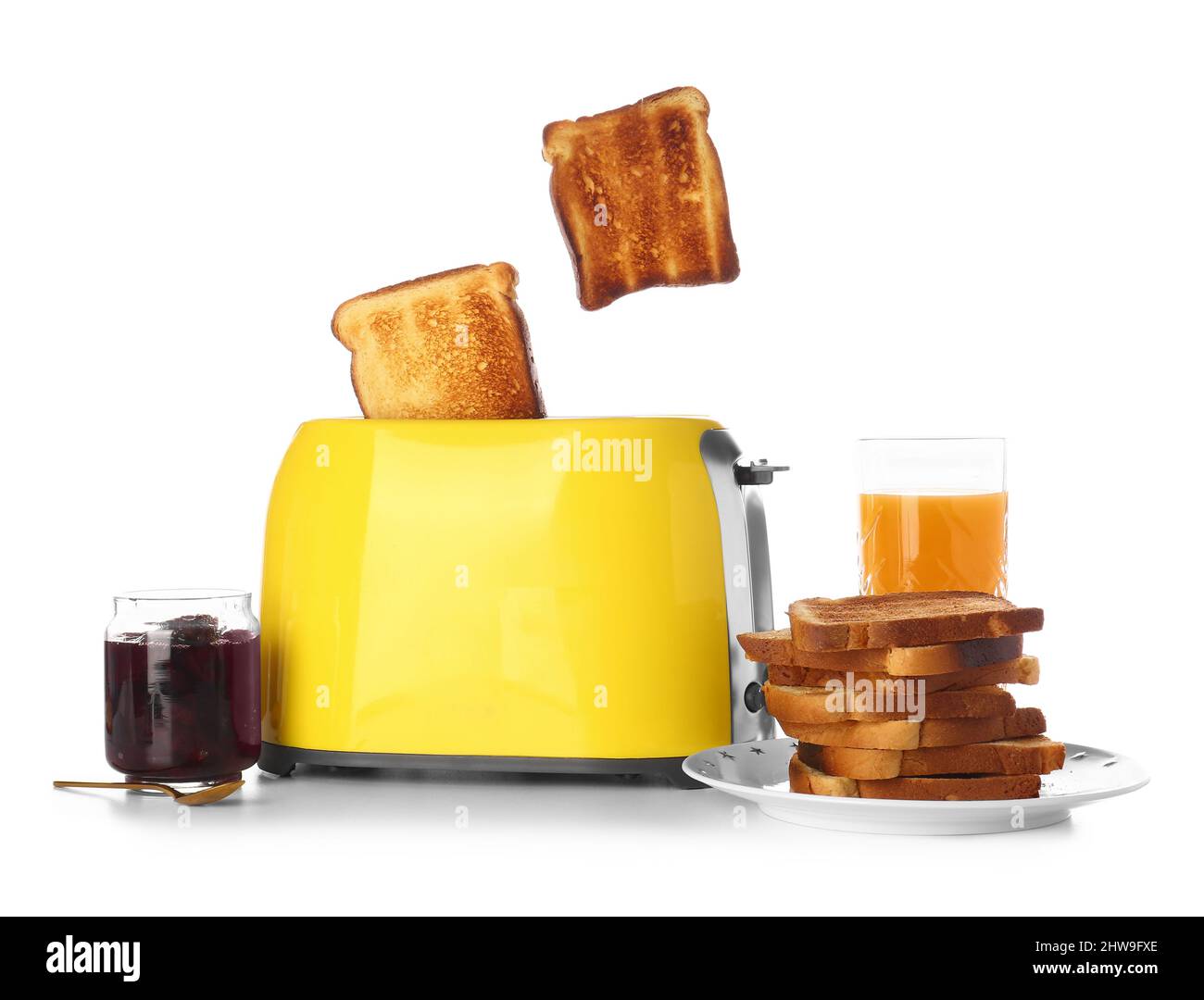 Modern toaster with bread slices, glass of juice and jam on white background Stock Photo - Alamy