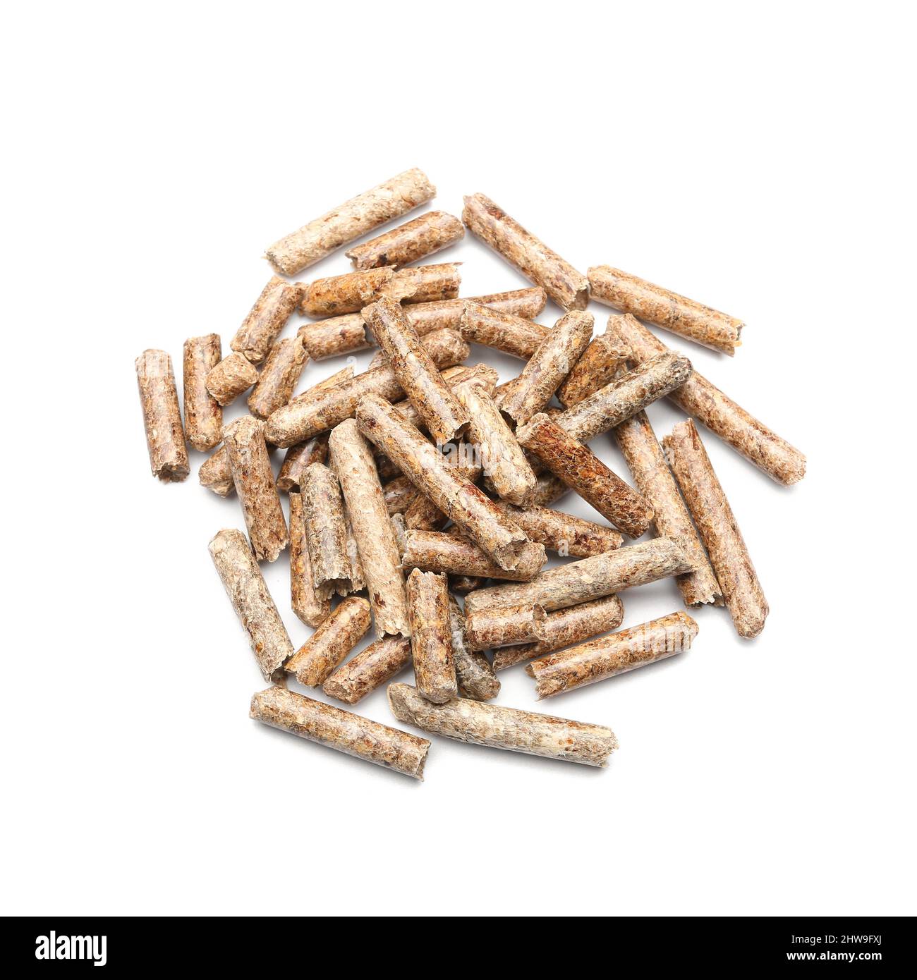 Pile of wood pellets on white background Stock Photo - Alamy