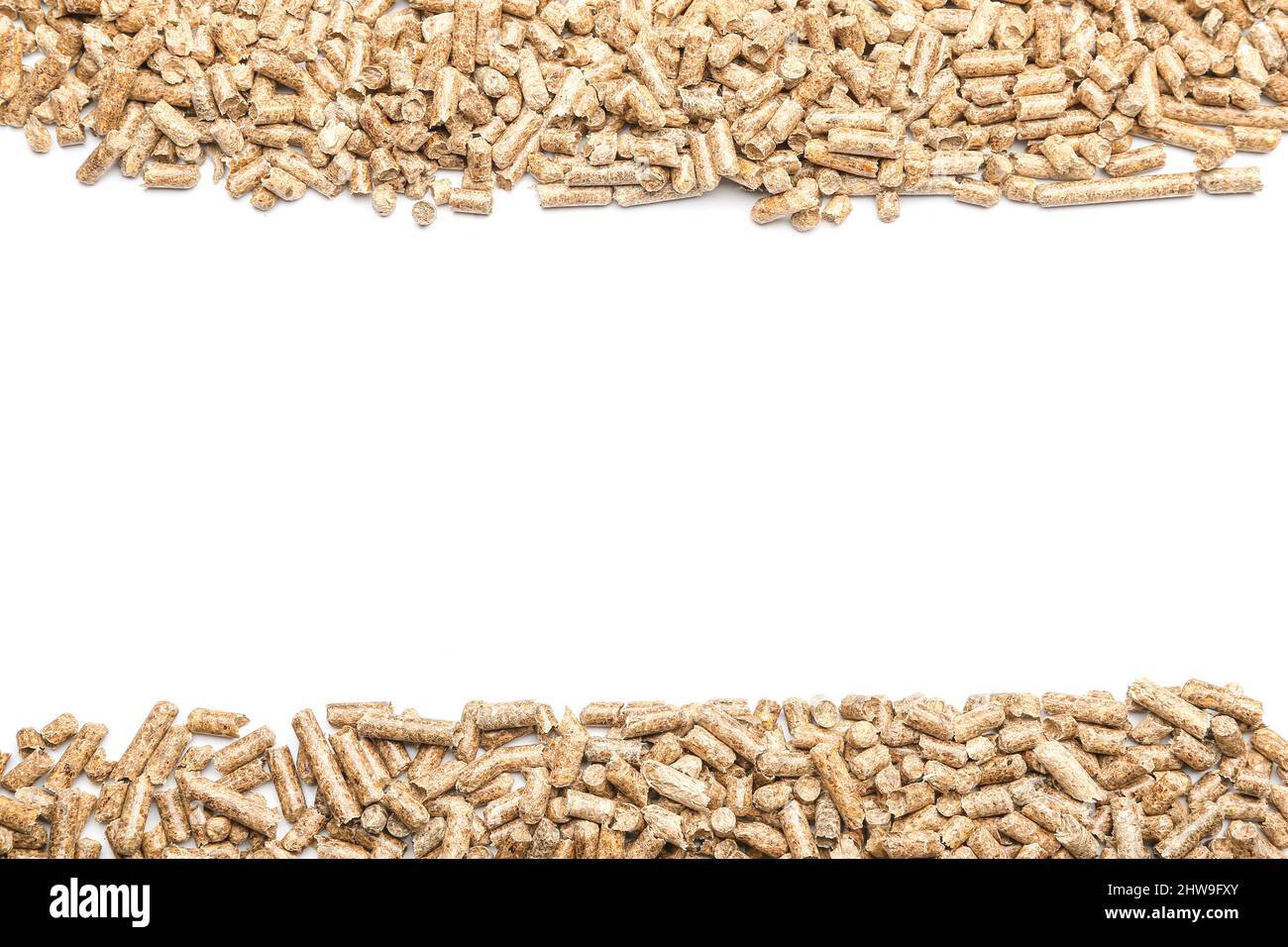 Wood pellets on white background Stock Photo - Alamy
