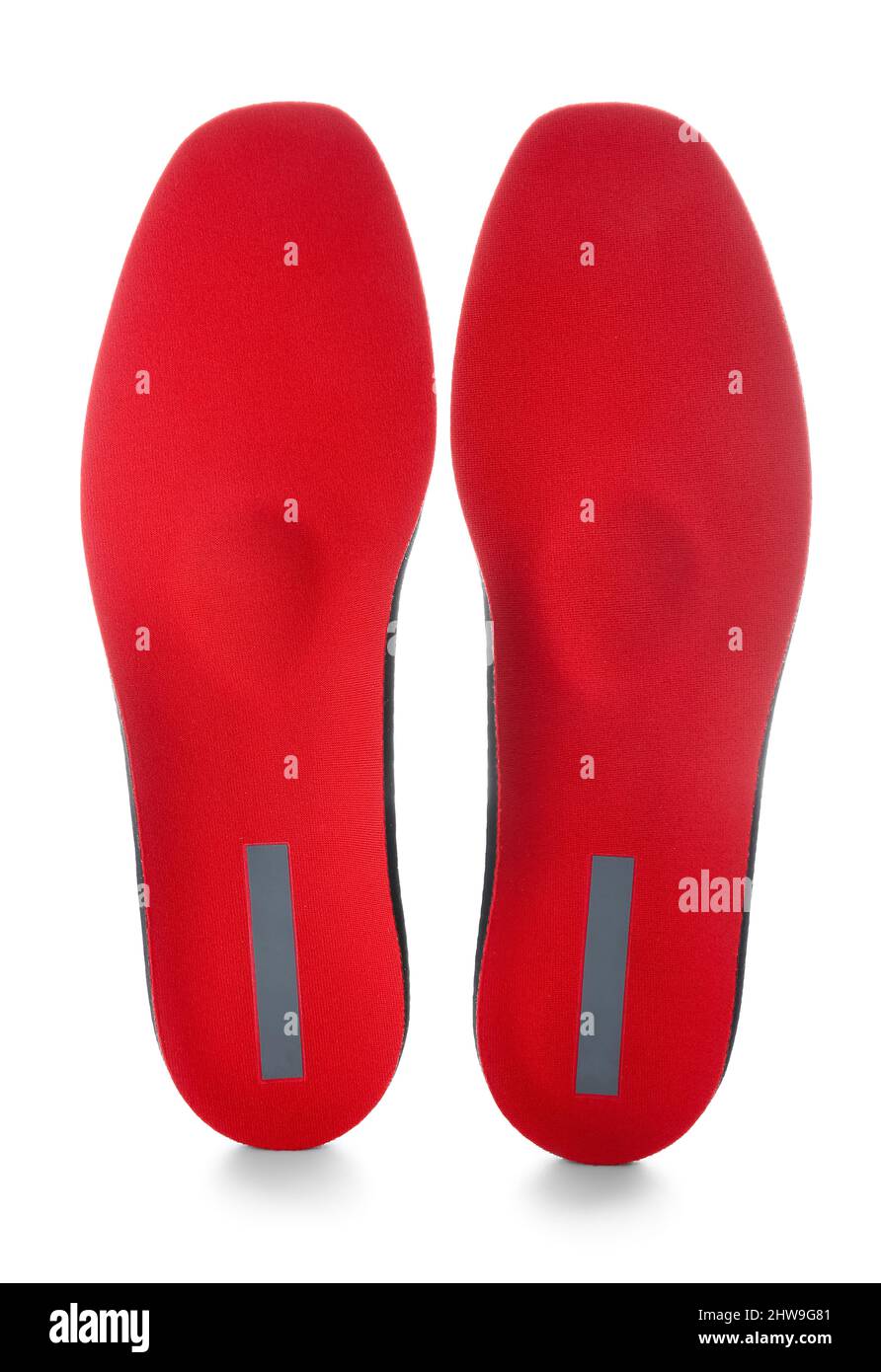 Red orthopedic insoles isolated on white background Stock Photo - Alamy