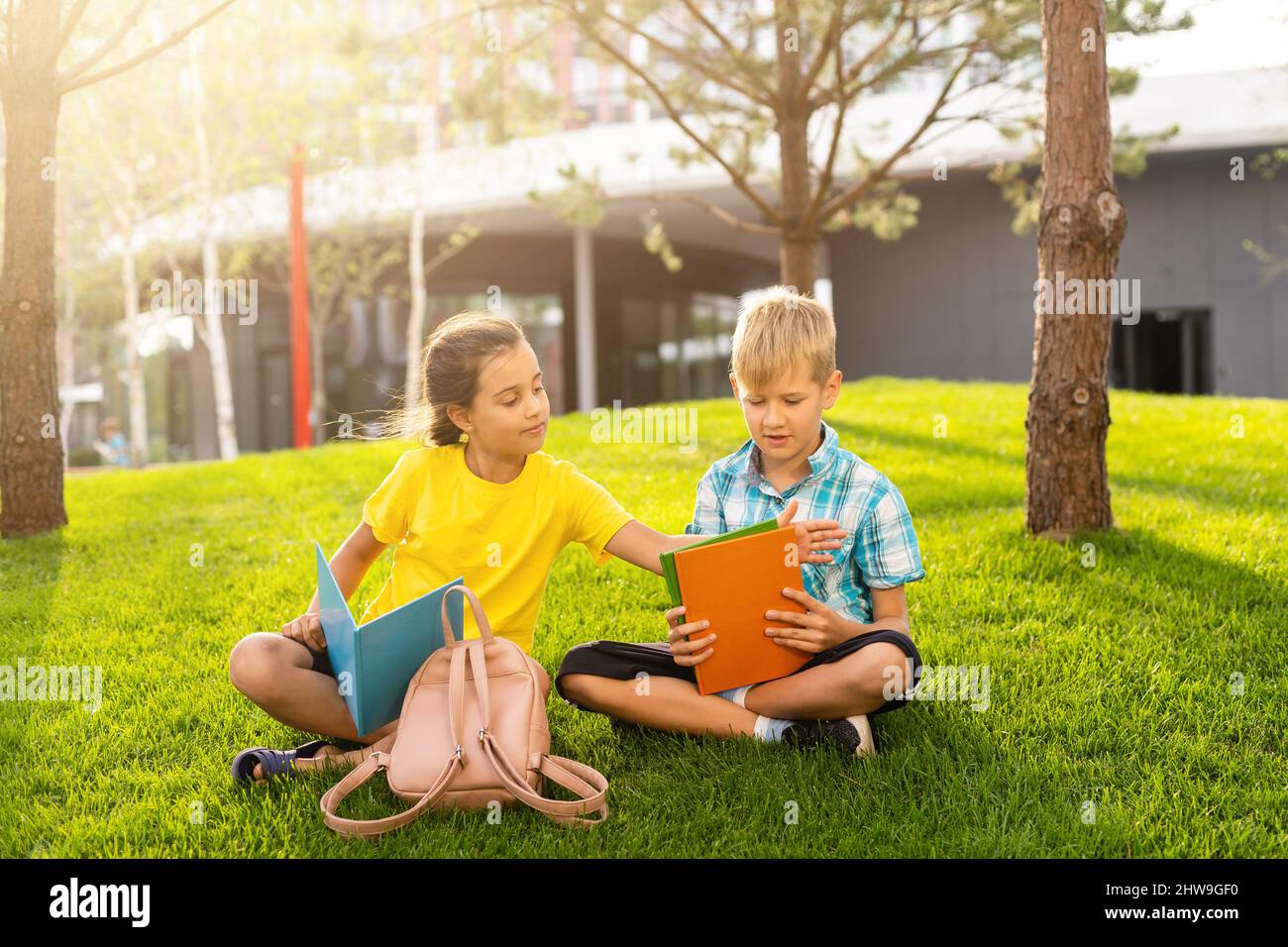 Elementary school kids having fun outdoors Stock Photo - Alamy