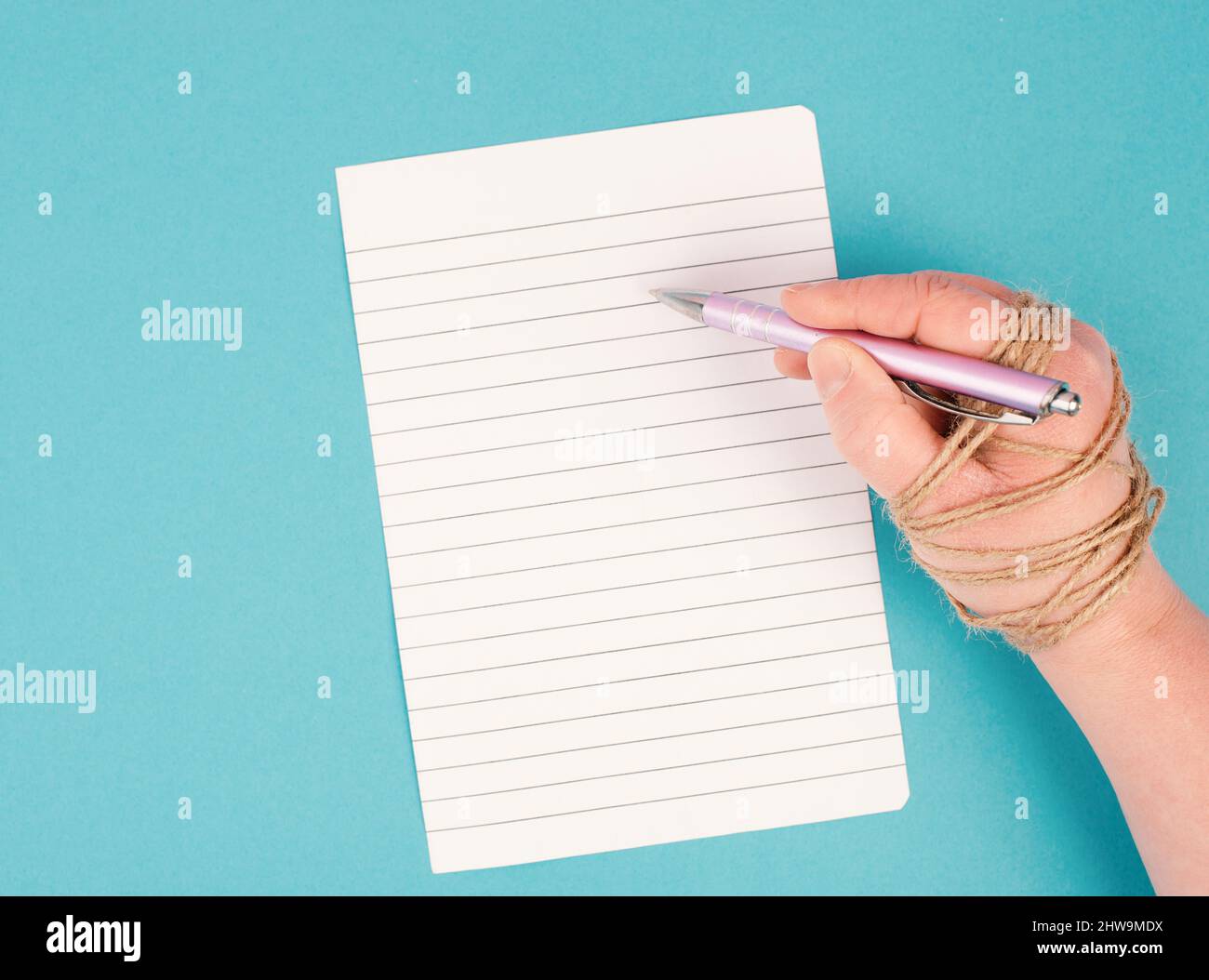 World Press Freedom Day, hand chained with a pen, free speech, cancel ...