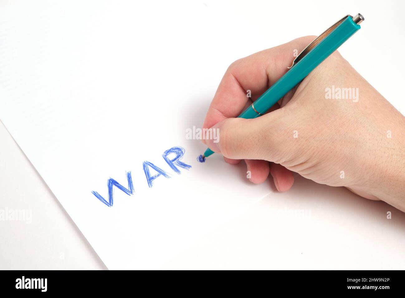Hand with ballpoint pen and inscription war on white sheet Stock Photo ...
