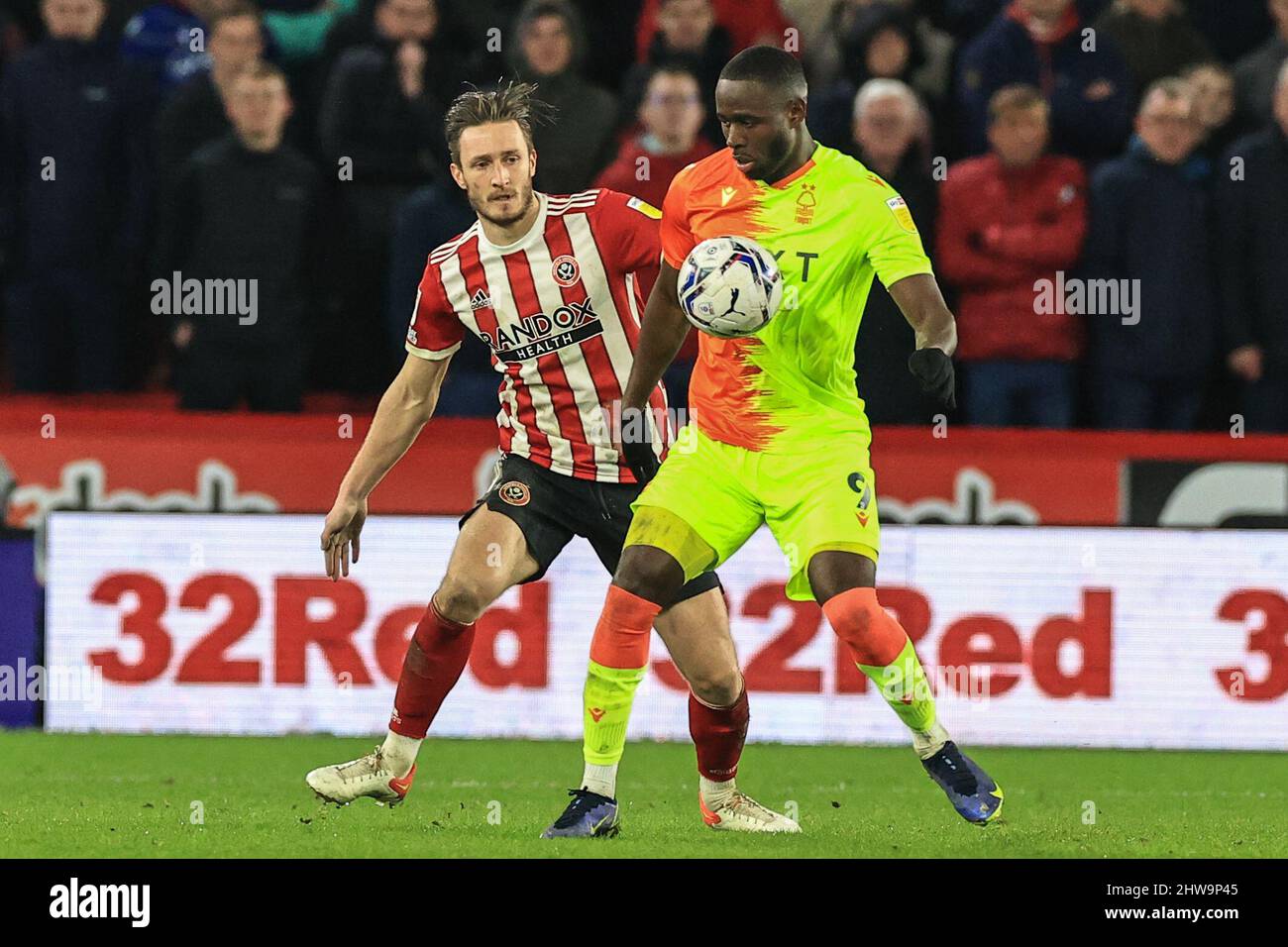 Keinan Davis #9 of Nottingham Forest holds off Morgan Gibbs-White #27 ...