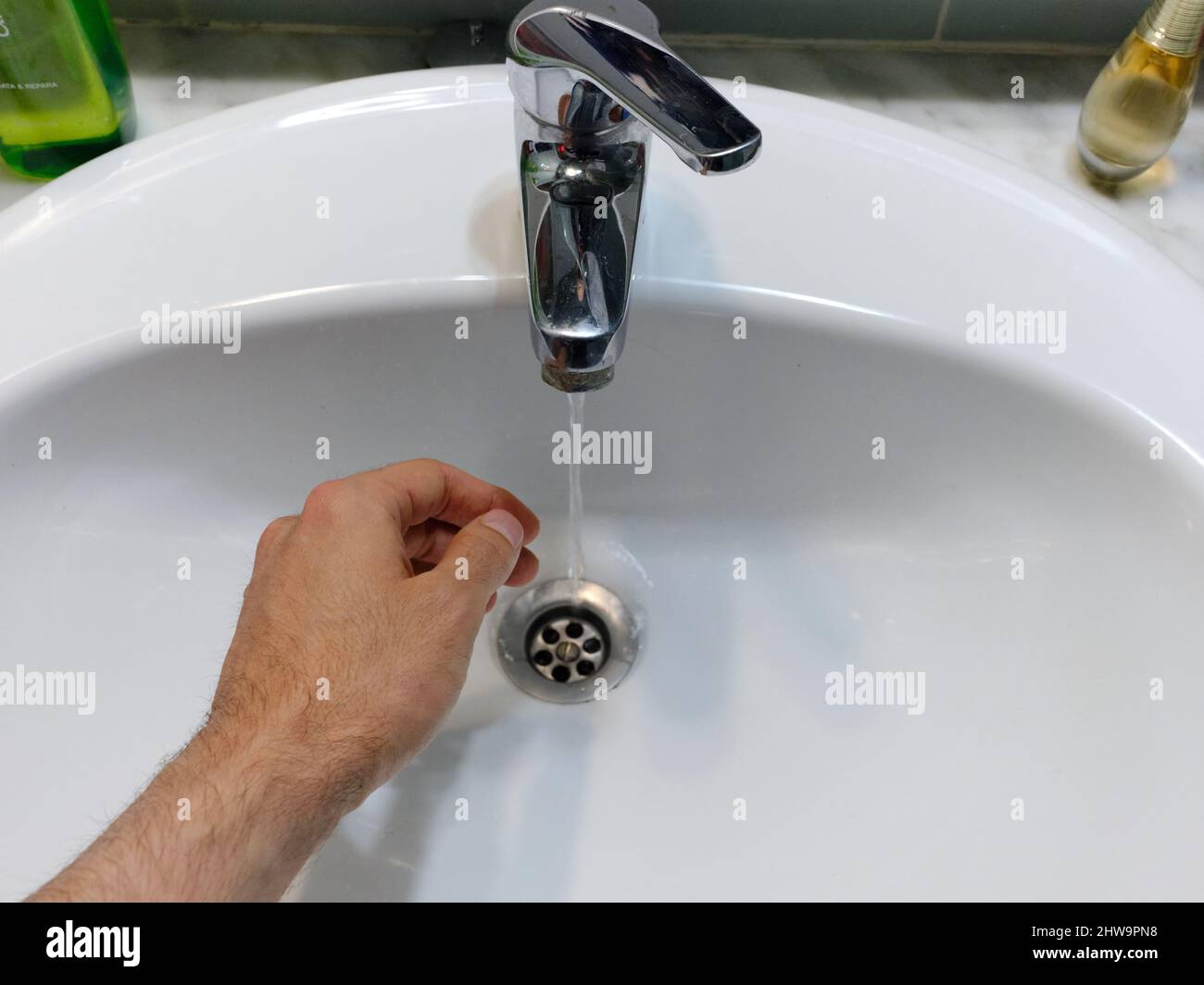 Hand running water hi-res stock photography and images - Alamy