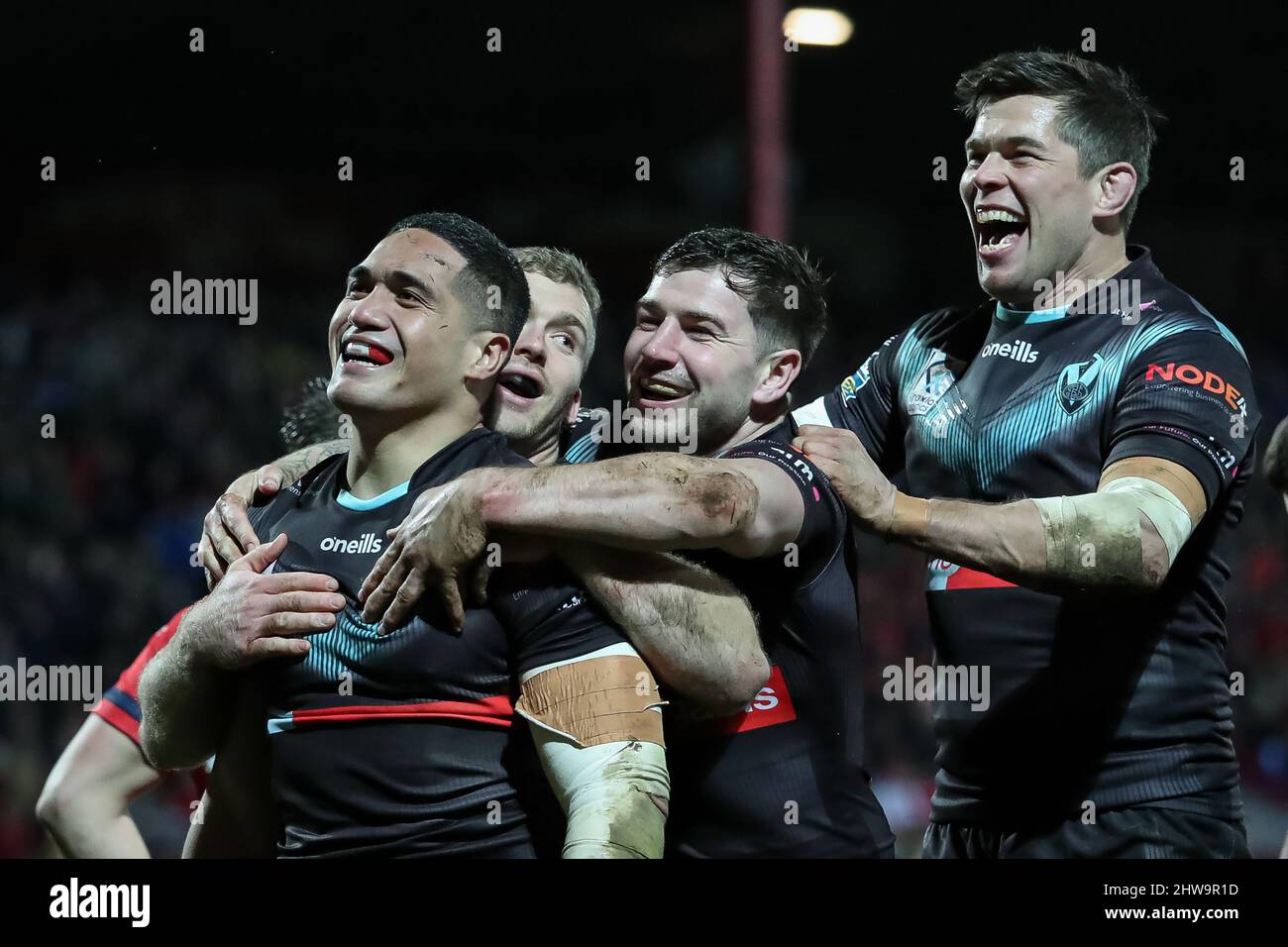 Sione Mata’utia #11 of St Helens celebrates his try in the second half ...