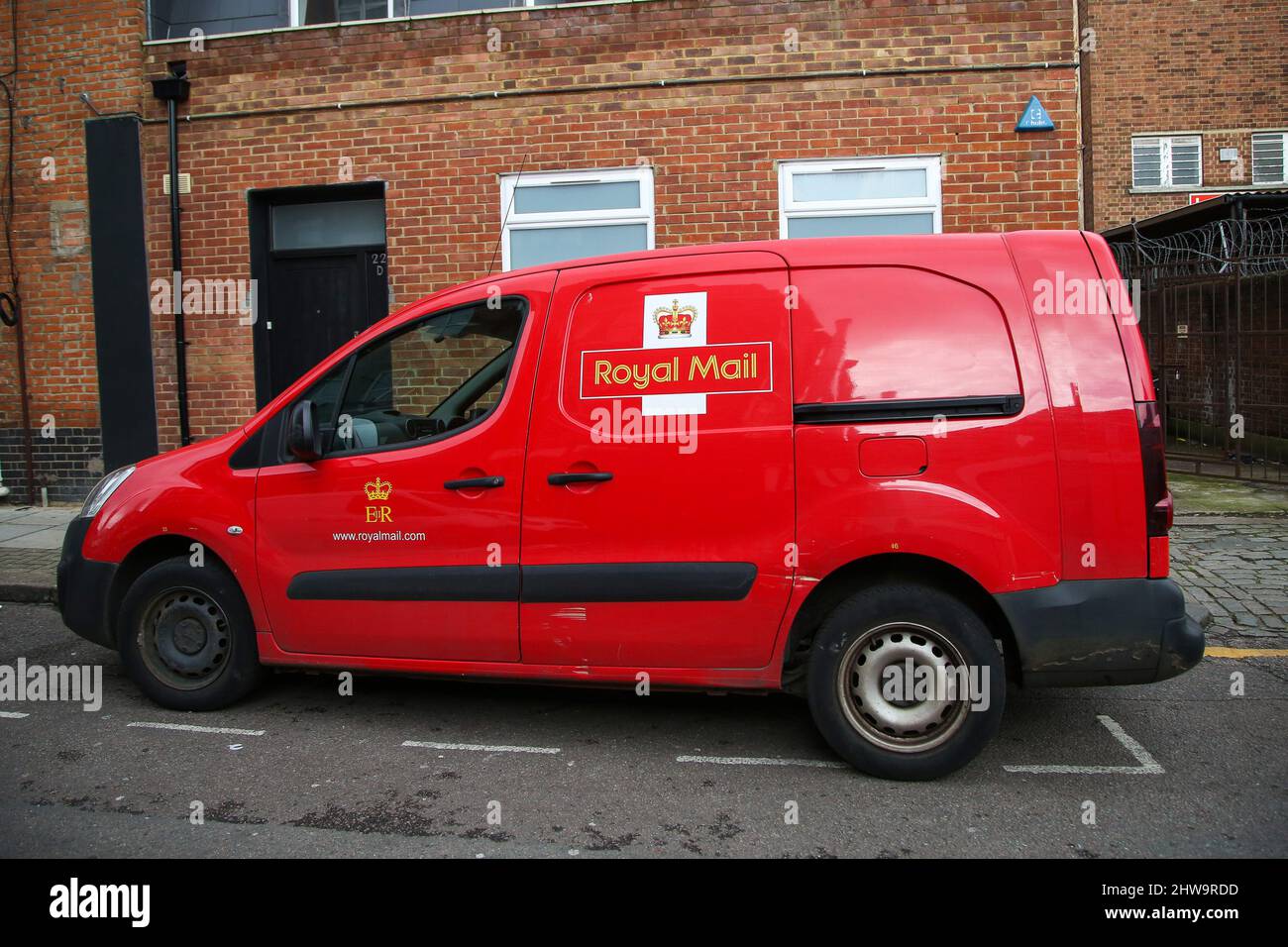 A Royal Mail delivery van parked on a road in London Stock Photo - Alamy