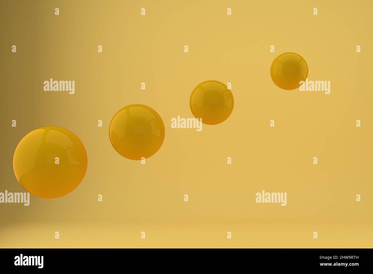 3D rendering of yellow spheres in diminishing sizes floating against a ...