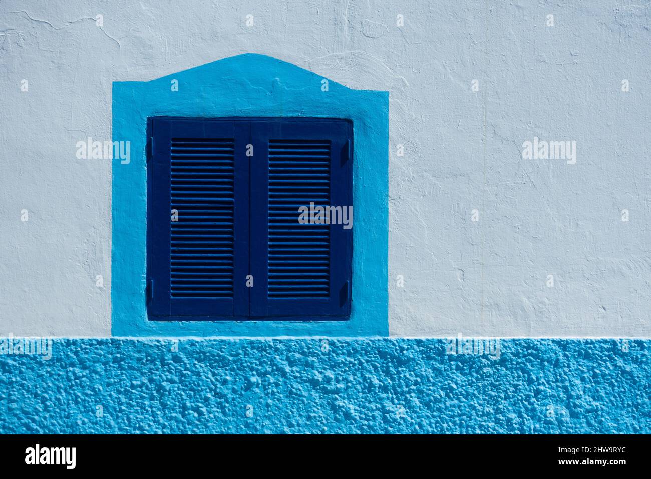 Blue window shutters on house in Spain Stock Photo - Alamy