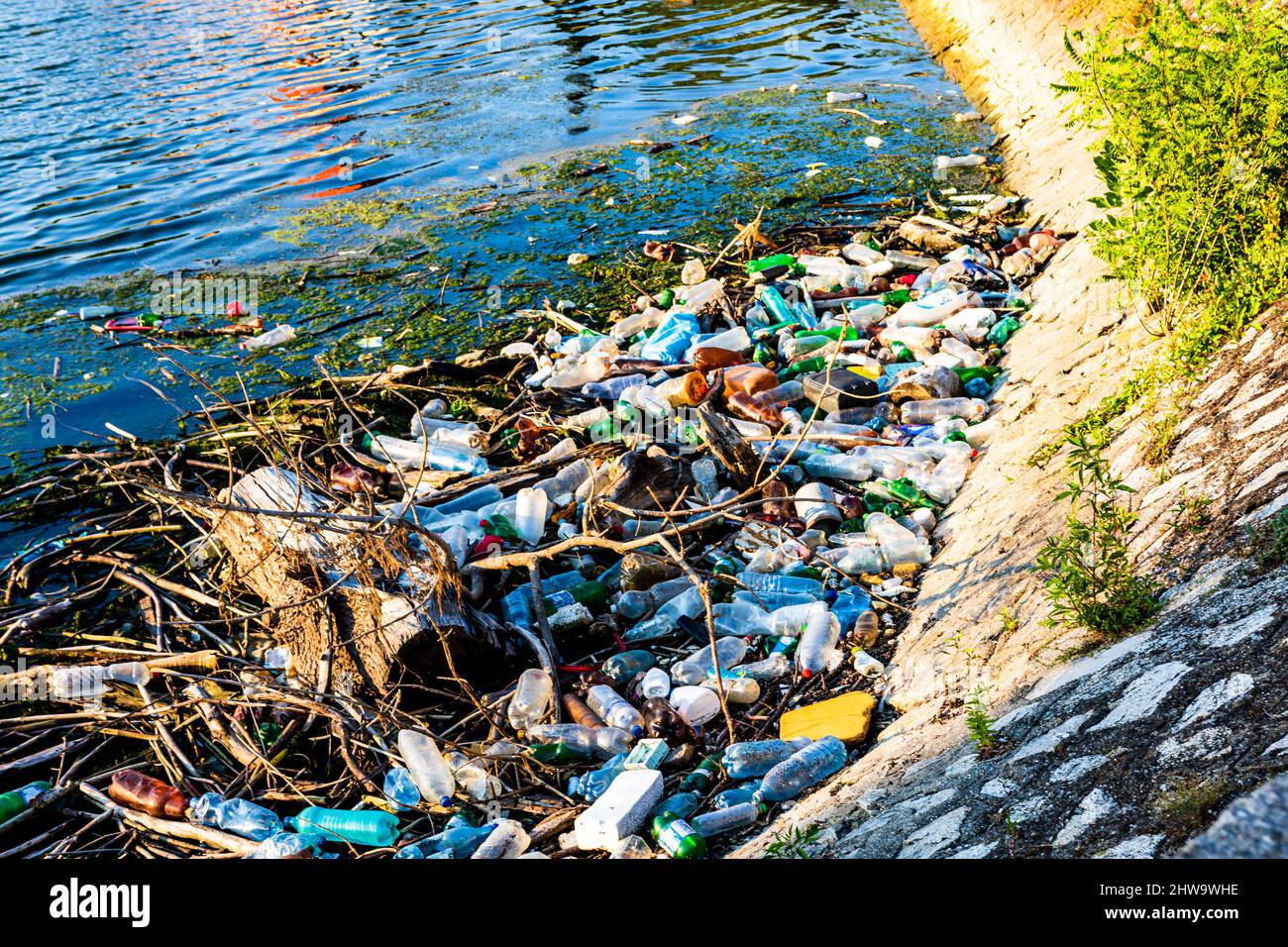 Dirty polluted waste water with garbages. Environment pollution concept ...