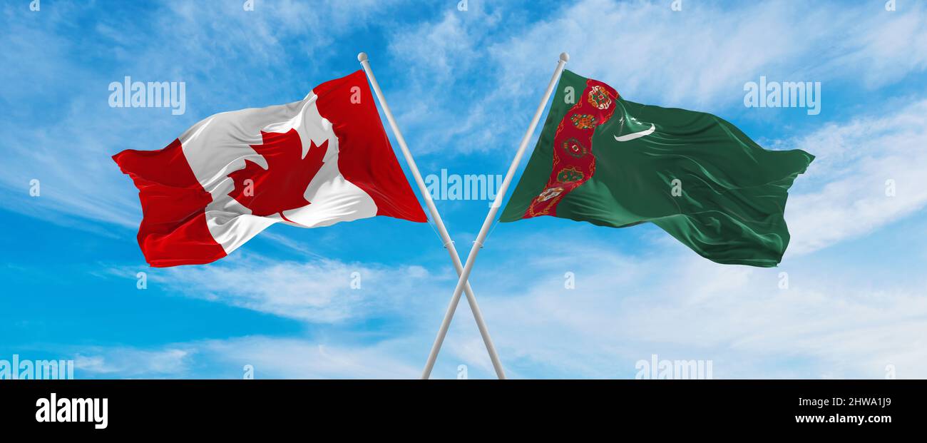 crossed national flags of Canada and Turkmenistan flag waving in the ...