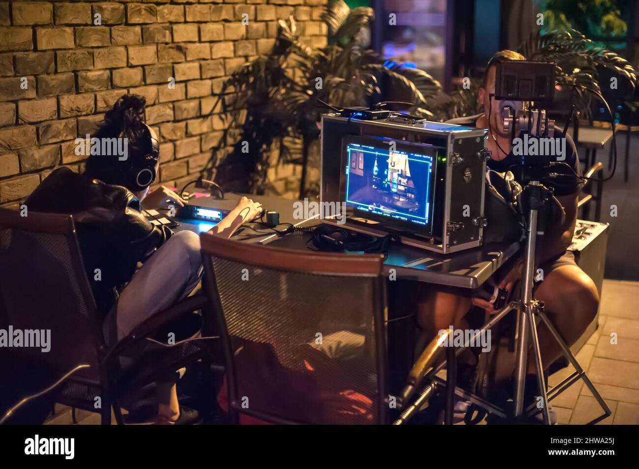 Behind the scenes. Outdoor editing studio for monitoring and ...