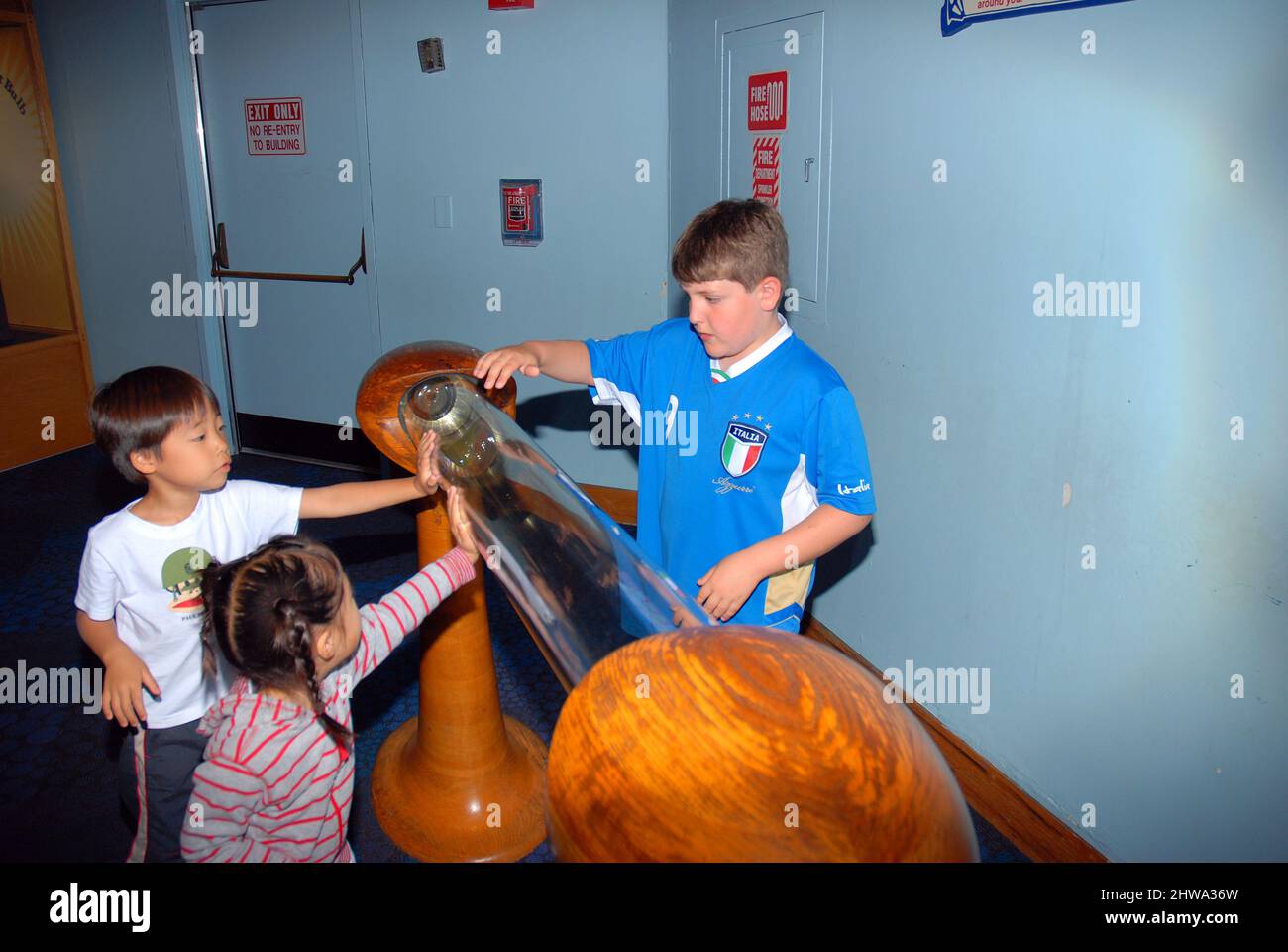 Children have fun at an interactive learning display at the Boston ...