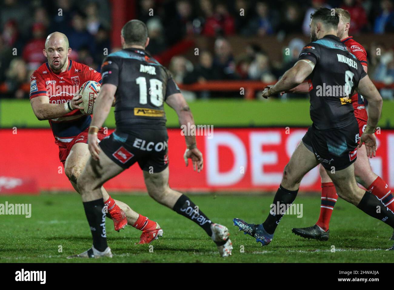 George King #10 of Hull KR runs at Kyle Amor (18) of St Helens Stock ...