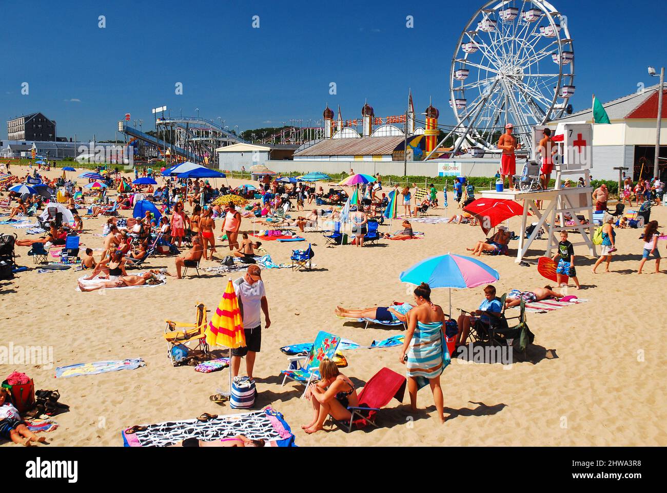 A summer crowd covers the sands at Old Orchard Beach, Maine Stock Photo ...