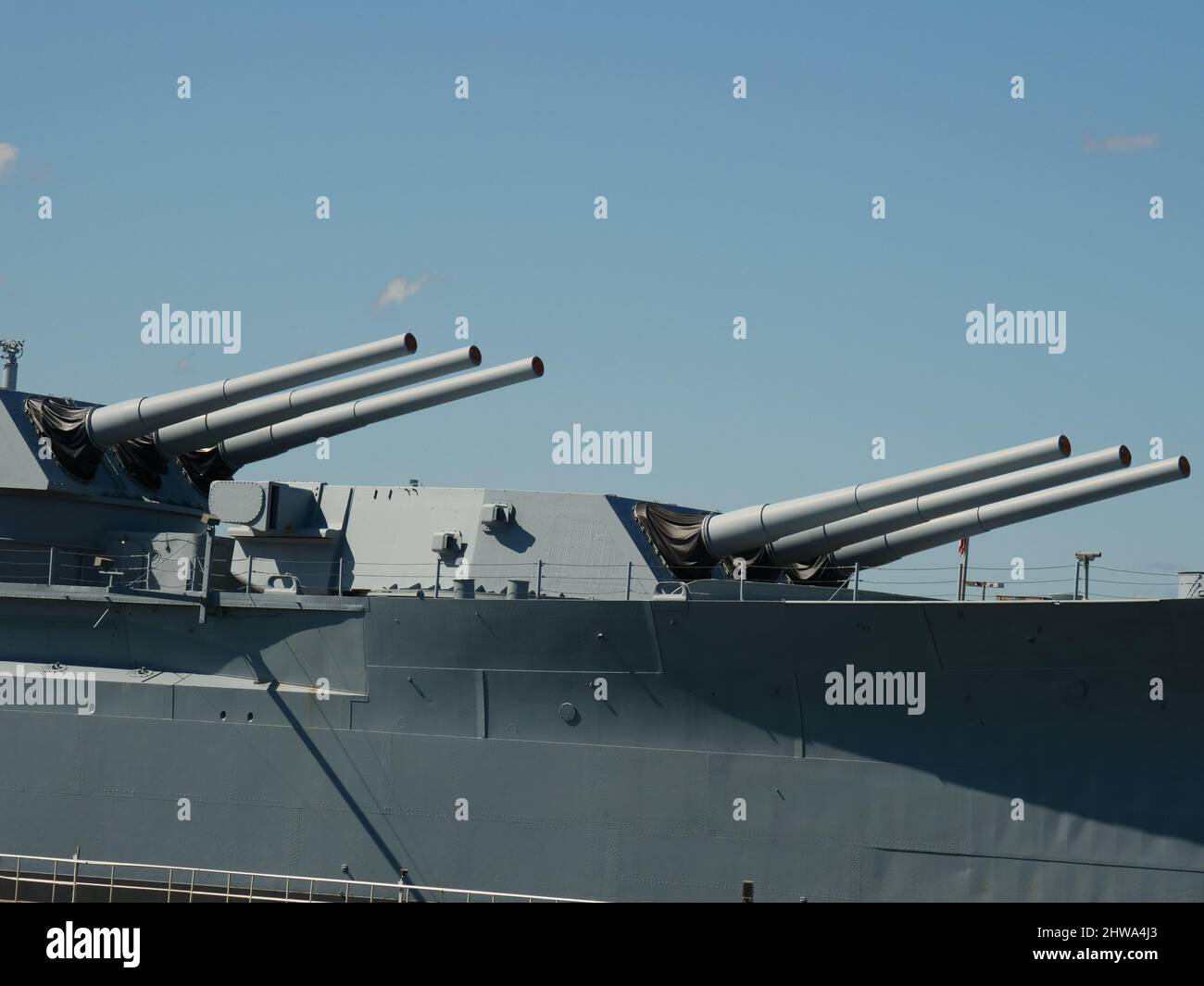 Closeup of the artillery guns under the clear blue sky Stock Photo - Alamy