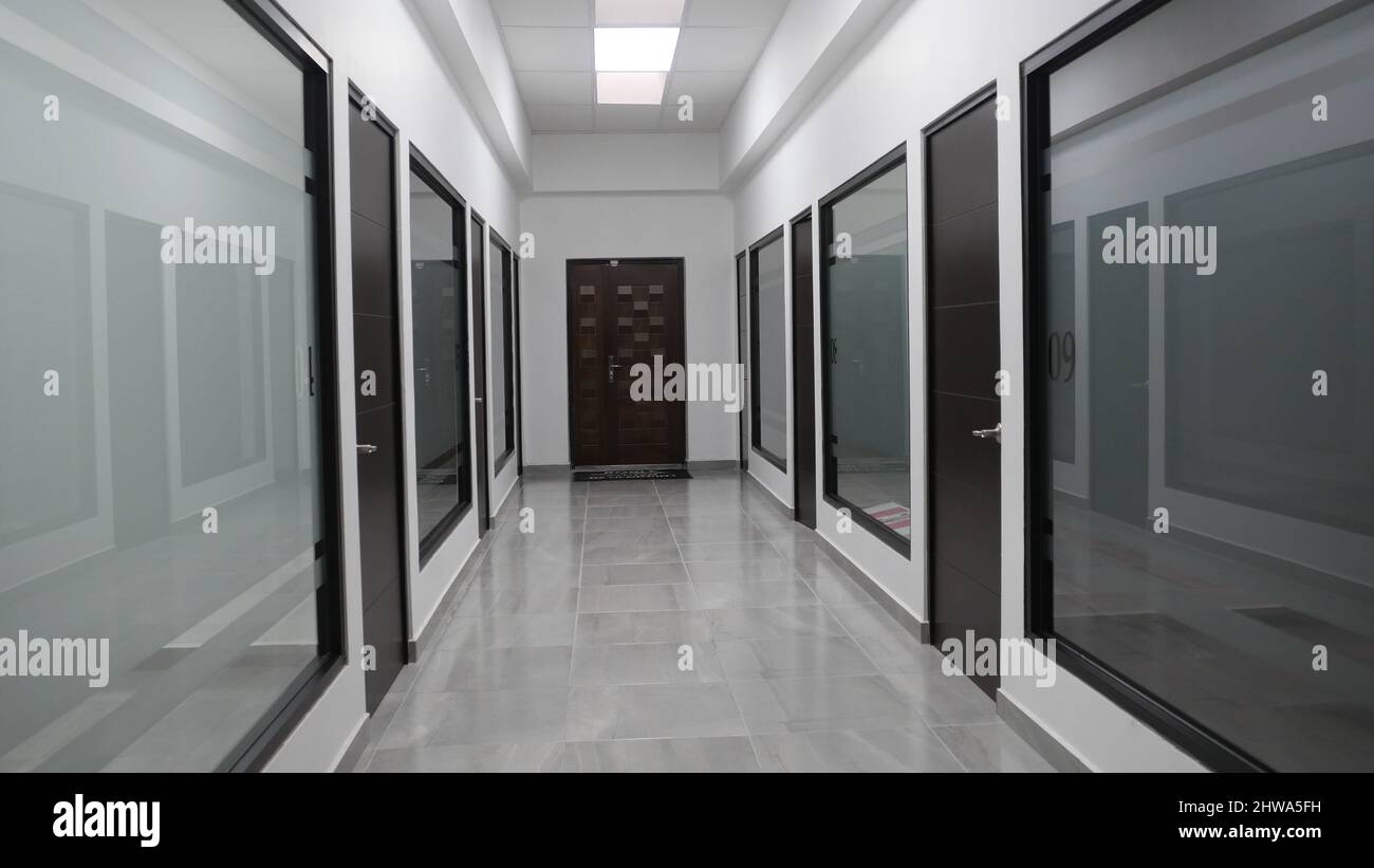 Hall interior with doors and wide glass windows Stock Photo - Alamy