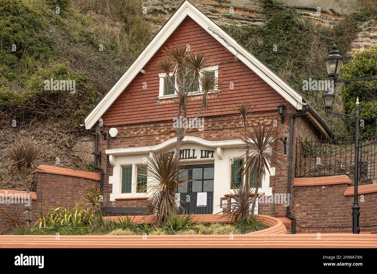 House on the side of a hill with a background of scrubland Stock Photo ...