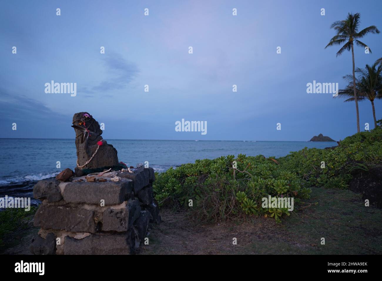 Shrine memorial with feather and beads in Kailua Beach Oahu Hawaii ...