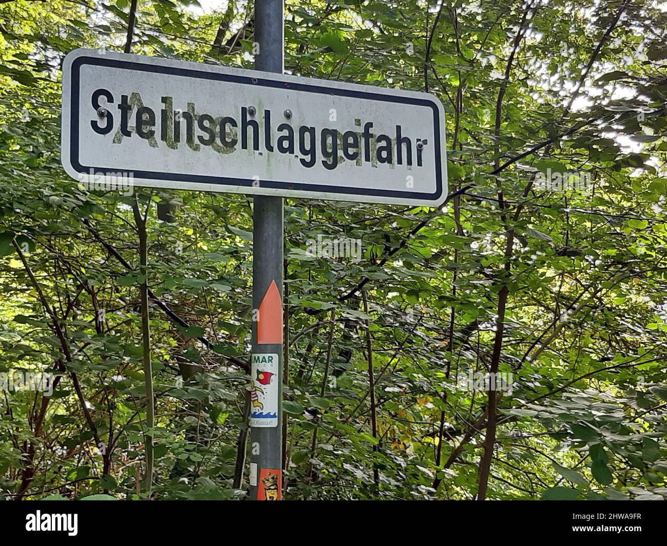 warning sign falling or fallen rocks, Germany Stock Photo - Alamy