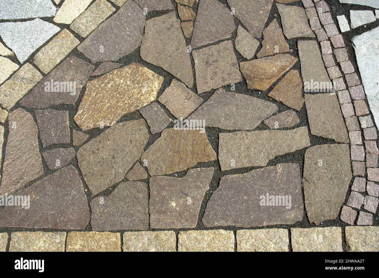 Permeable paving from porphyry Stock Photo - Alamy