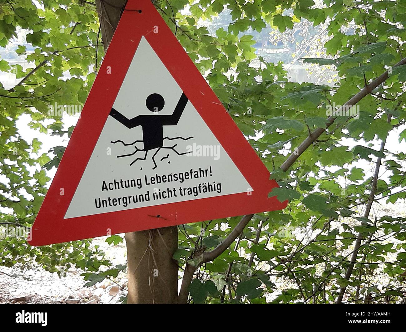 warning sign for unsustainable subsoil, Germany Stock Photo - Alamy