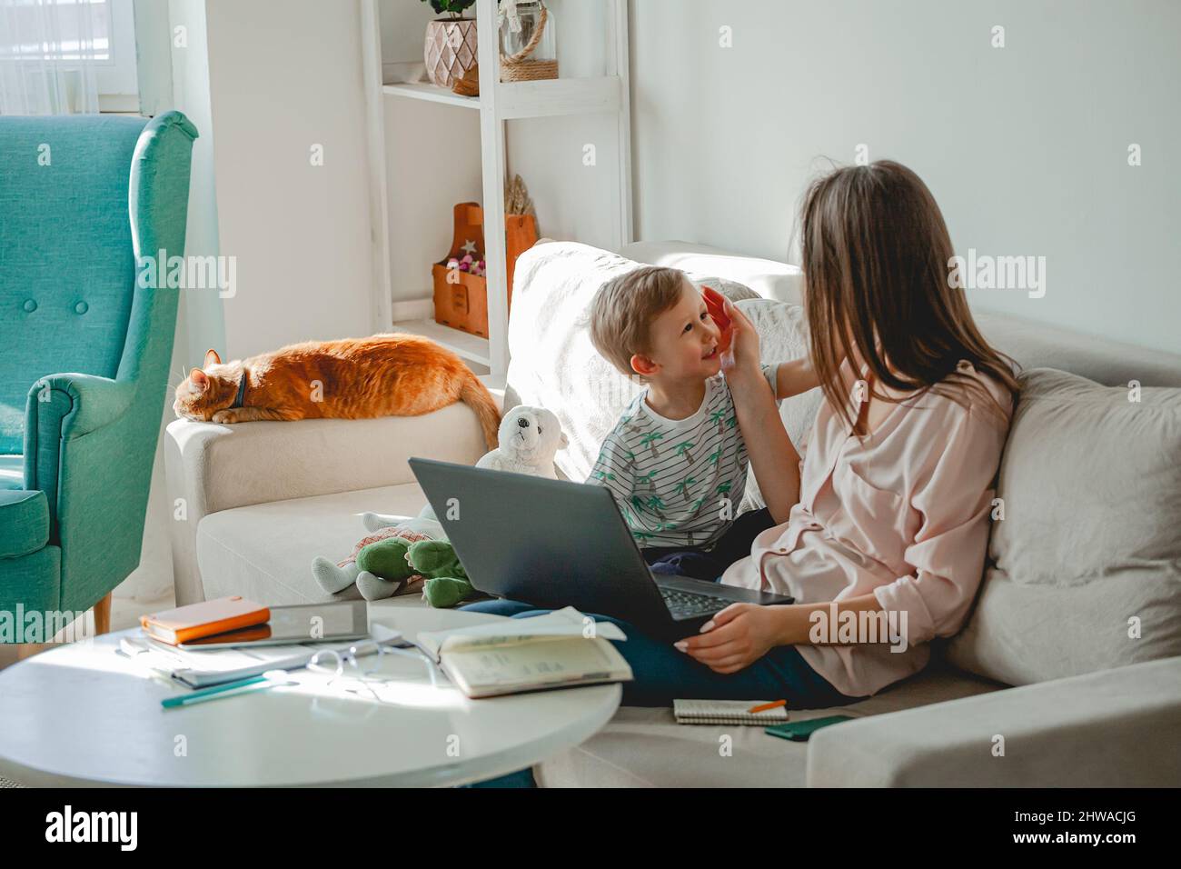 Concept work at home and home family education, mother working w Stock ...