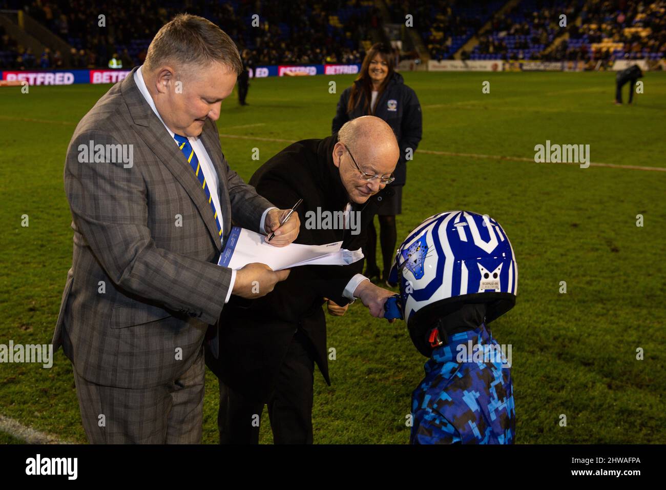Whizzy Rascal delivers a contract to Warrington Wolves chairman Stuart ...