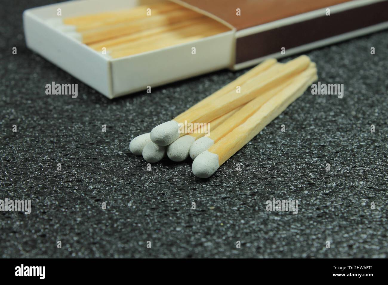 Close-up photo of some matches with their box beside them Stock Photo ...