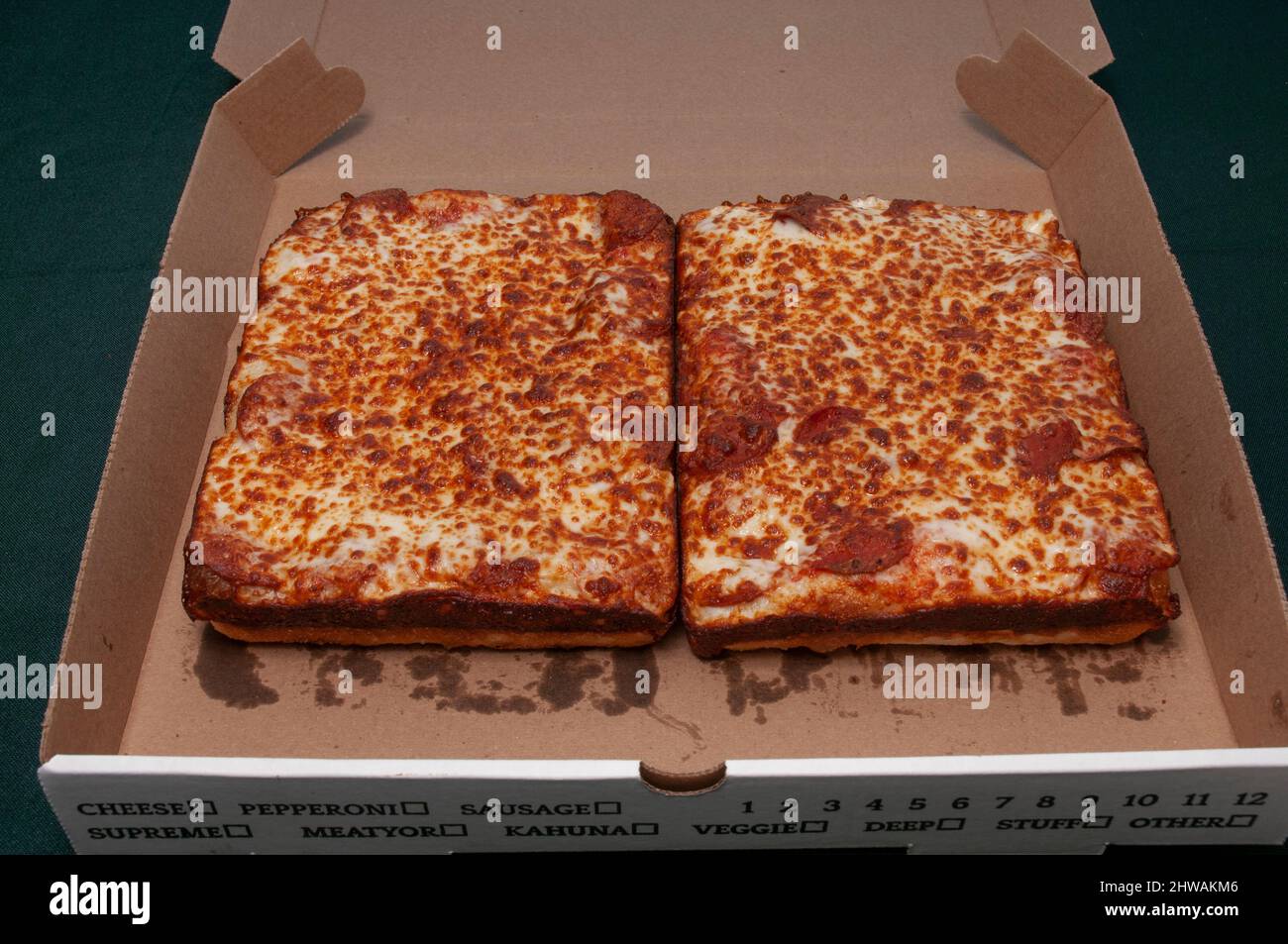 Delicious hot and tasty deep dish pepperoni pizza Stock Photo - Alamy