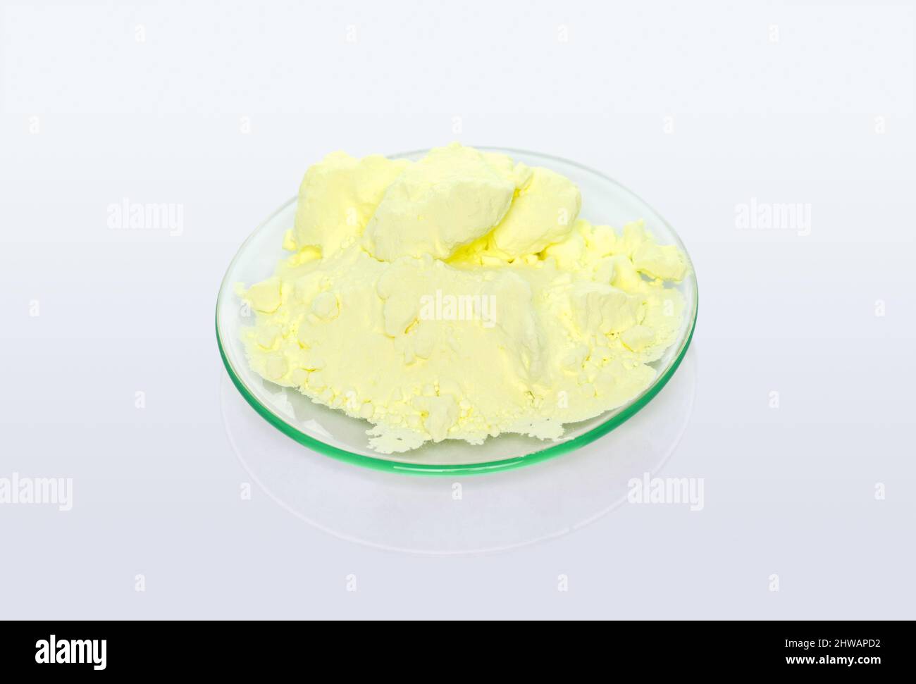 Sulfur Powder in Chemical Watch Glass. Closeup chemical ingredient on ...