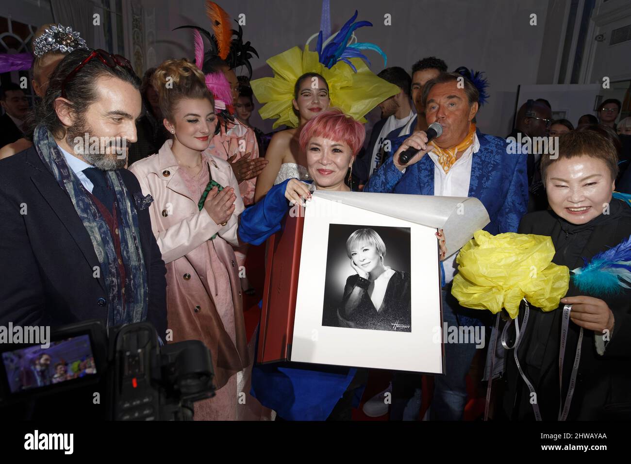 Paris, France. 03rd Mar, 2022. Grace Moon discovers her portrait ...