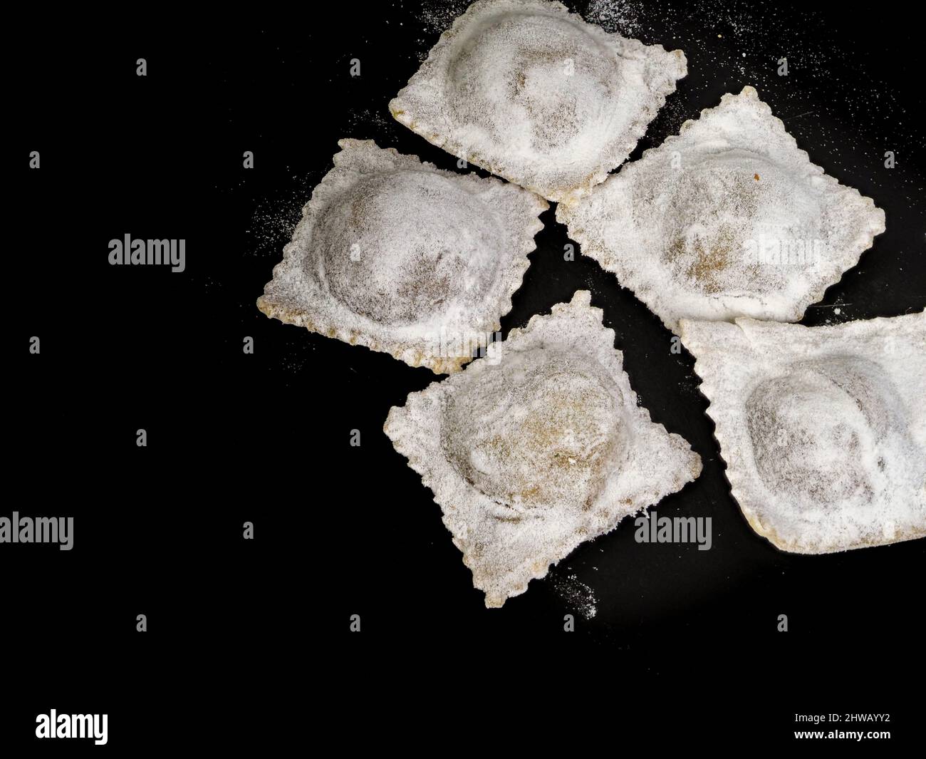 Raw fresh organic veggie ravioli stuffed italian pasta Stock Photo - Alamy