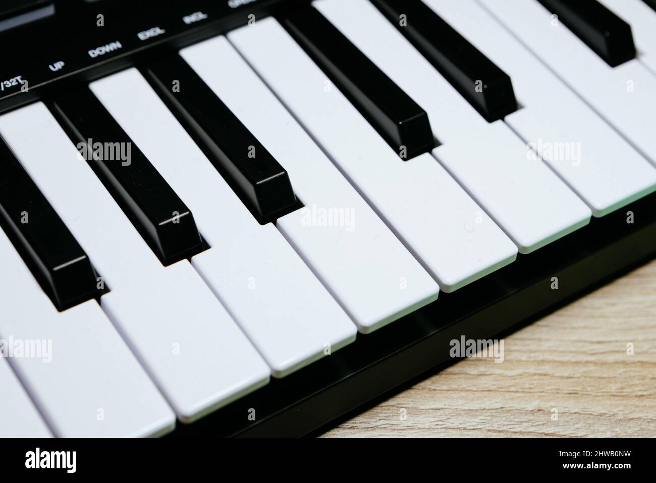 Hand on piano key in hi-res stock photography and images - Alamy