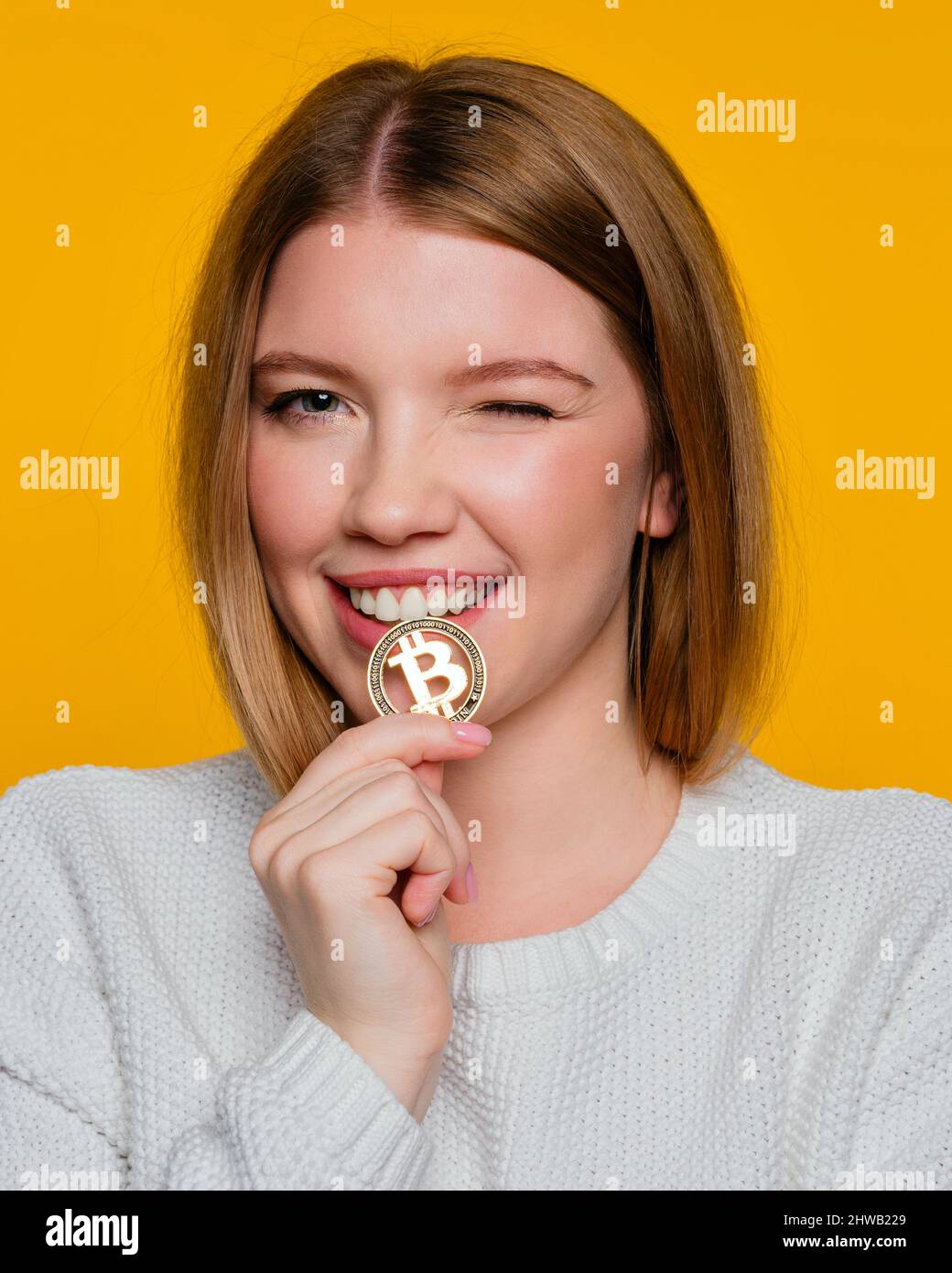 Biting gold coin hi-res stock photography and images - Alamy