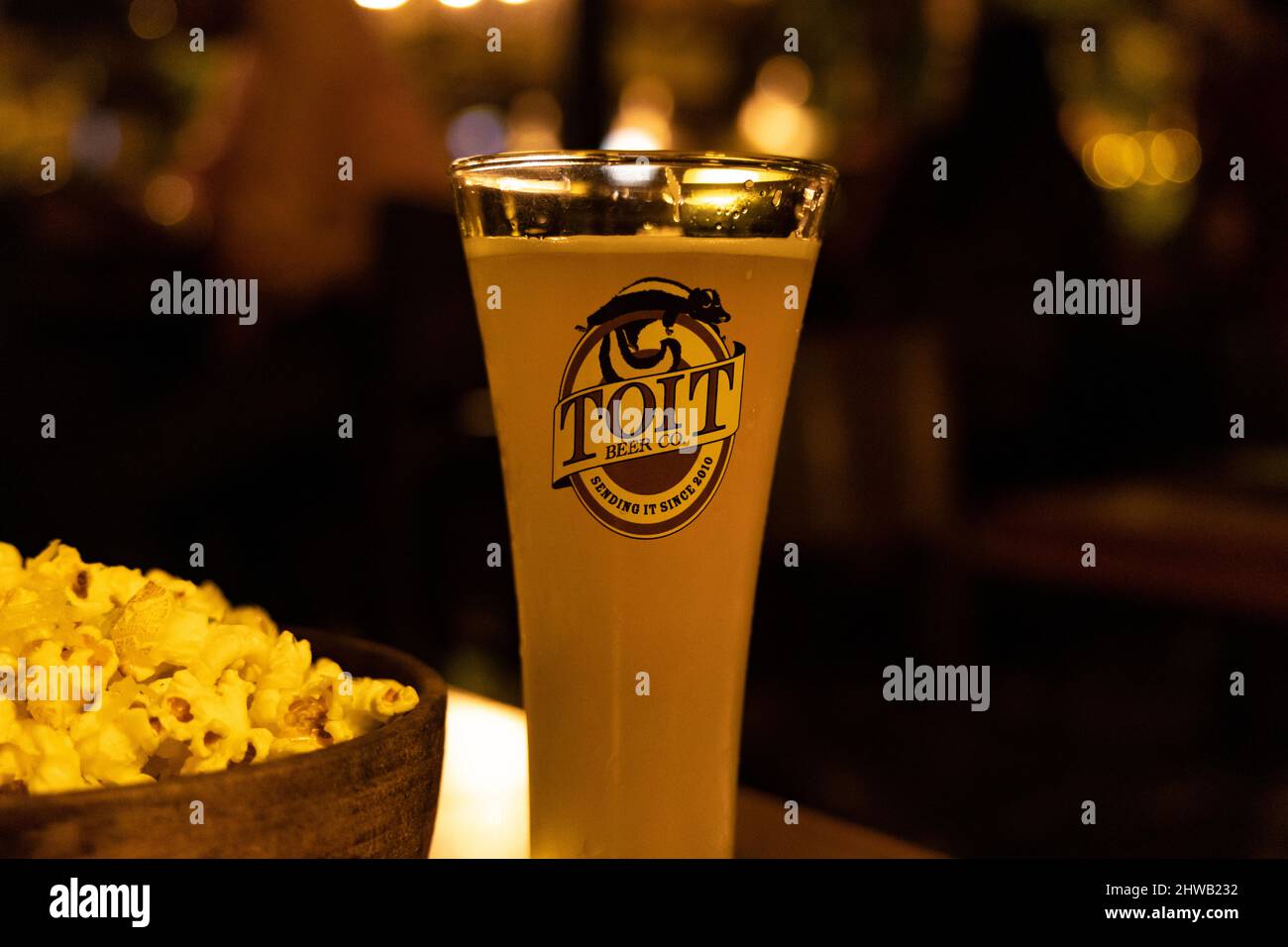 Half Pint of Toit Tint-In-Wit Beer along with Popcorn at Toit Brewpub ...