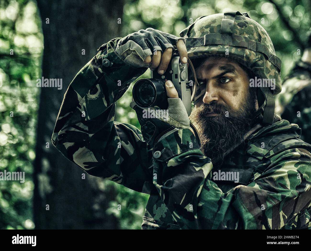 Military photojournalist documenting war, military press photographer ...