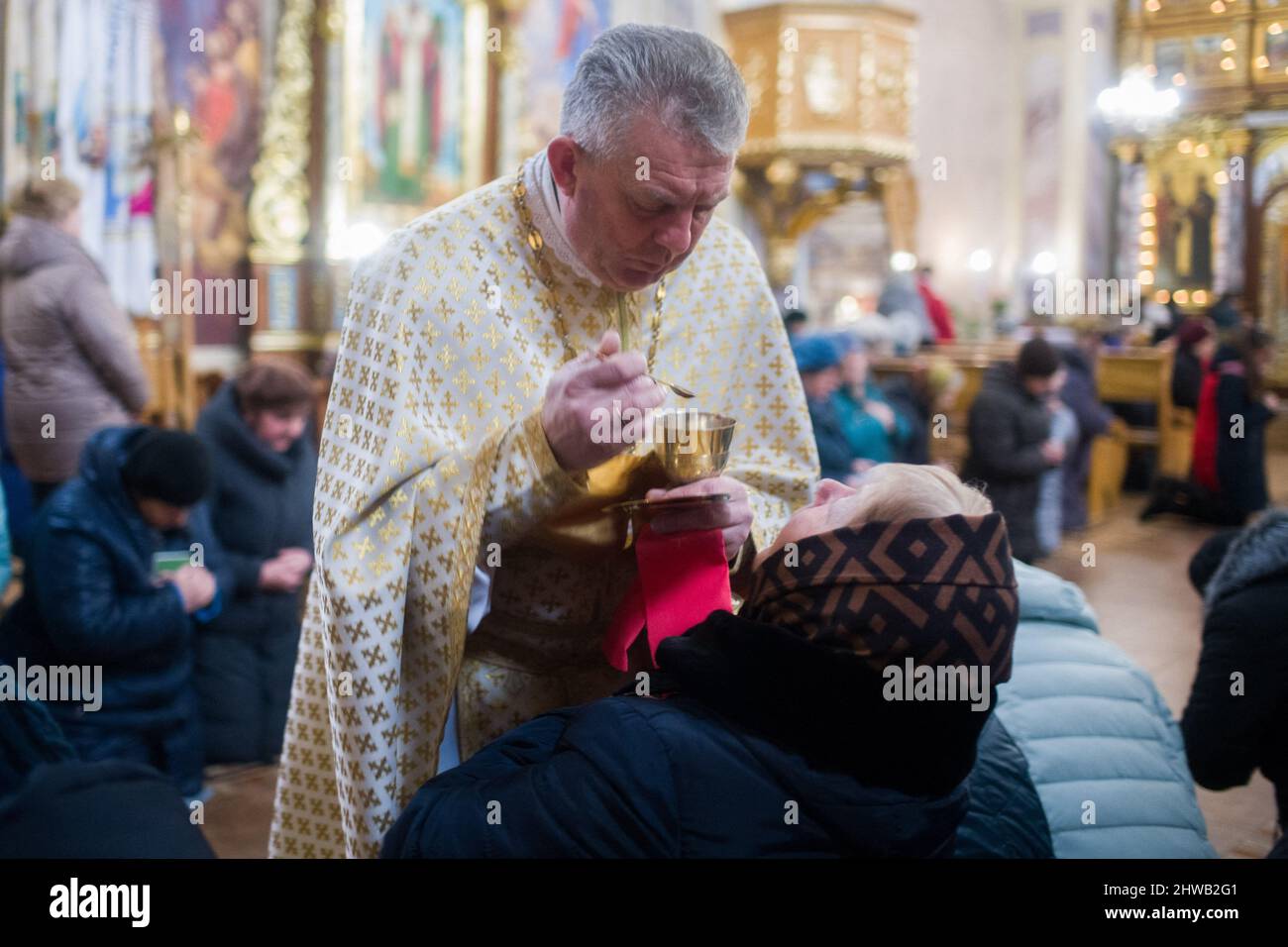 Women praying for their husbands, sons, fathers fighting against ...