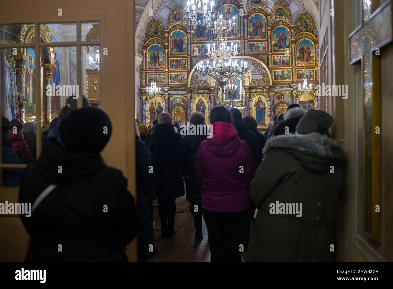 Women praying for their husbands, sons, fathers fighting against ...