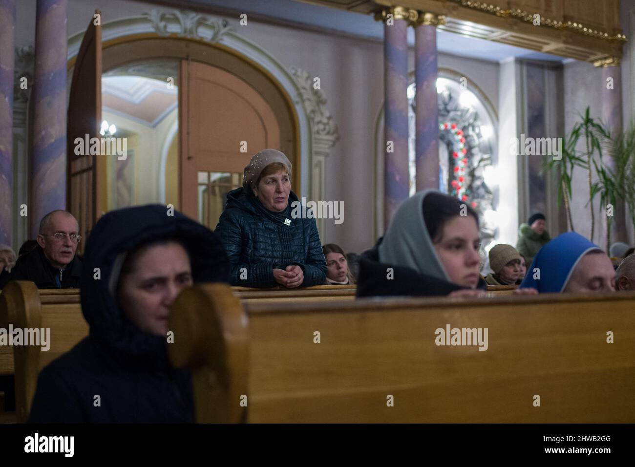 Women praying for their husbands, sons, fathers fighting against ...