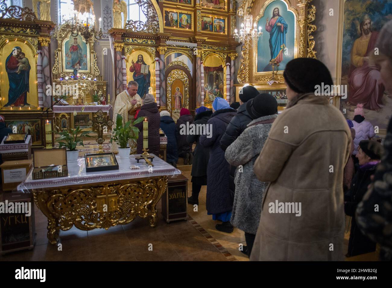 Women praying for their husbands, sons, fathers fighting against ...