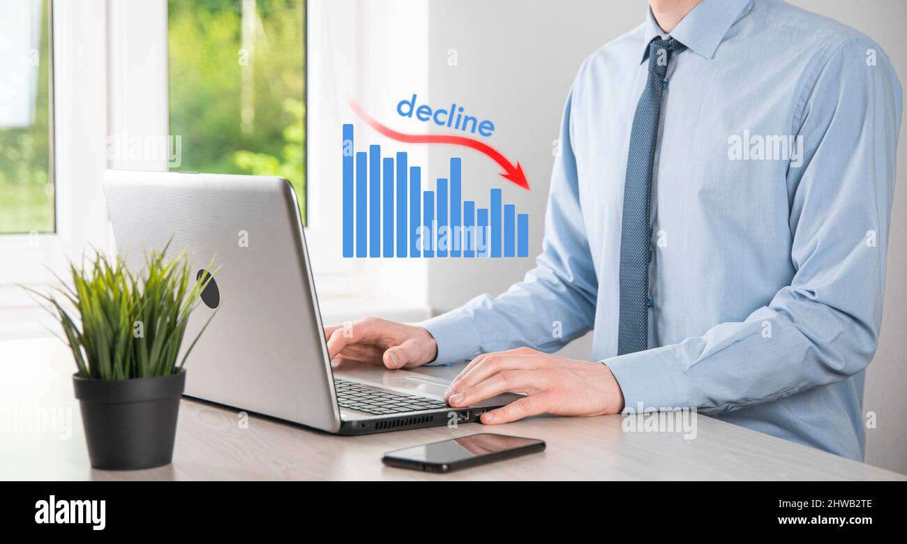 Business man holding holographic graphs and stock market statistics ...