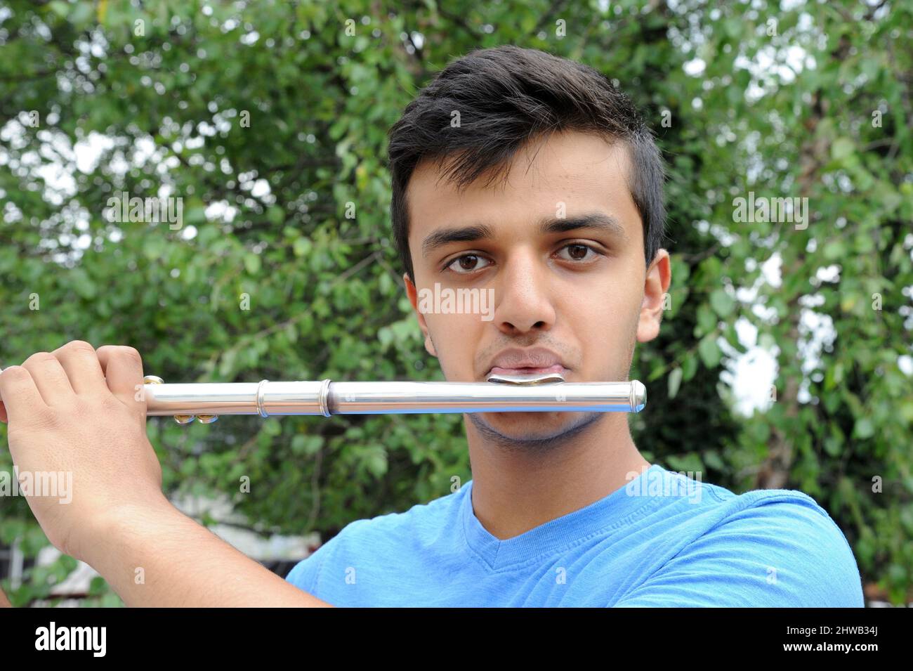 Mumbai Aug 17 2018 Indian Asian young flute music playing professional ...