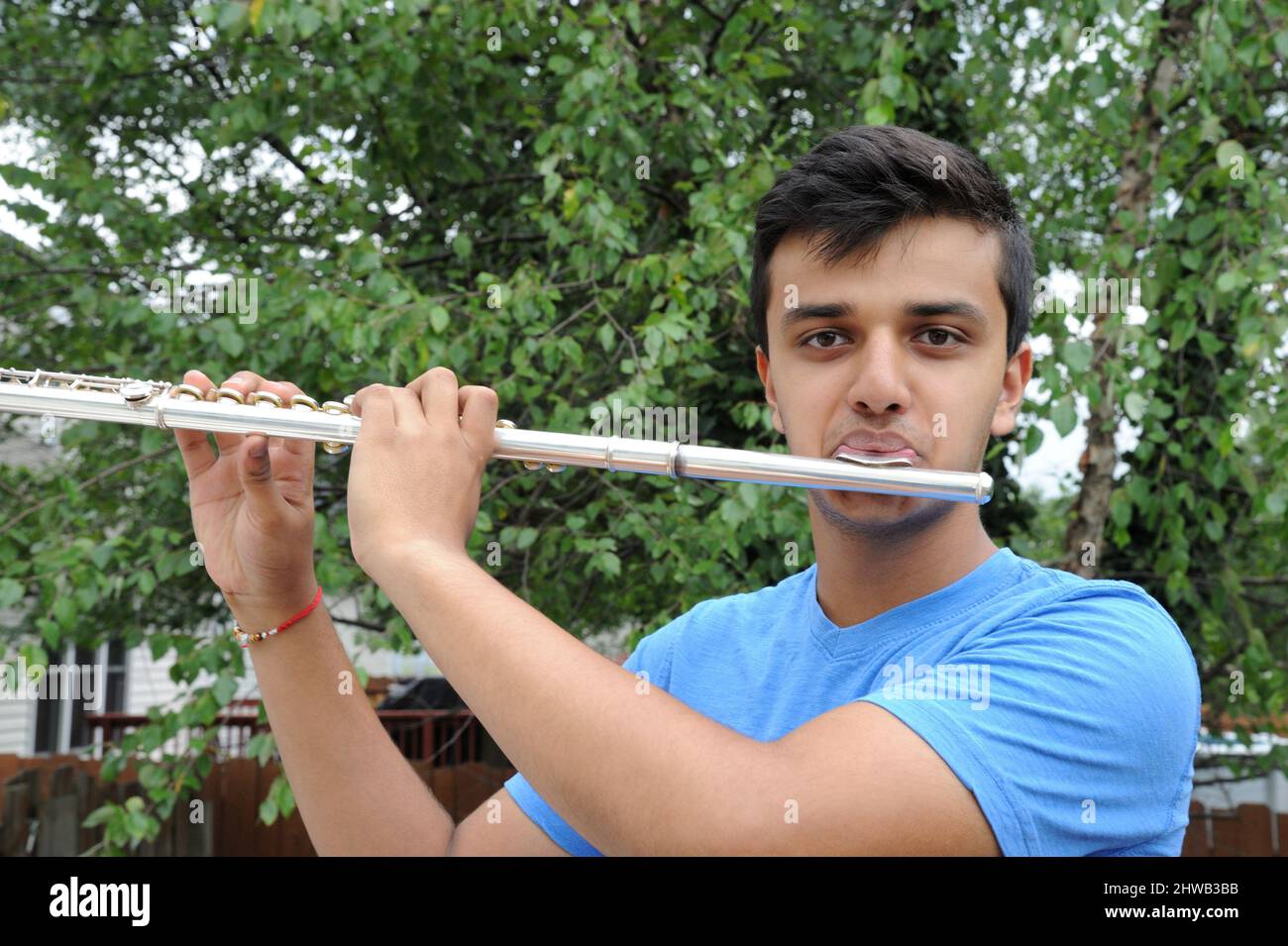 Mumbai Aug 17 2018 Indian Asian young flute music playing professional ...