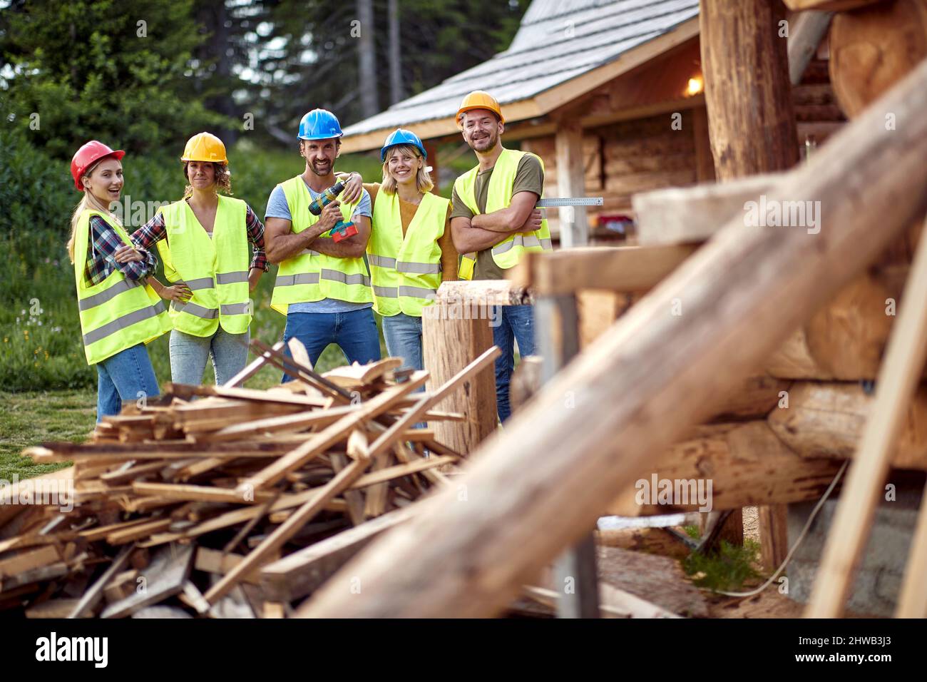 Group of construction workers powerful team. Young construction workers ...